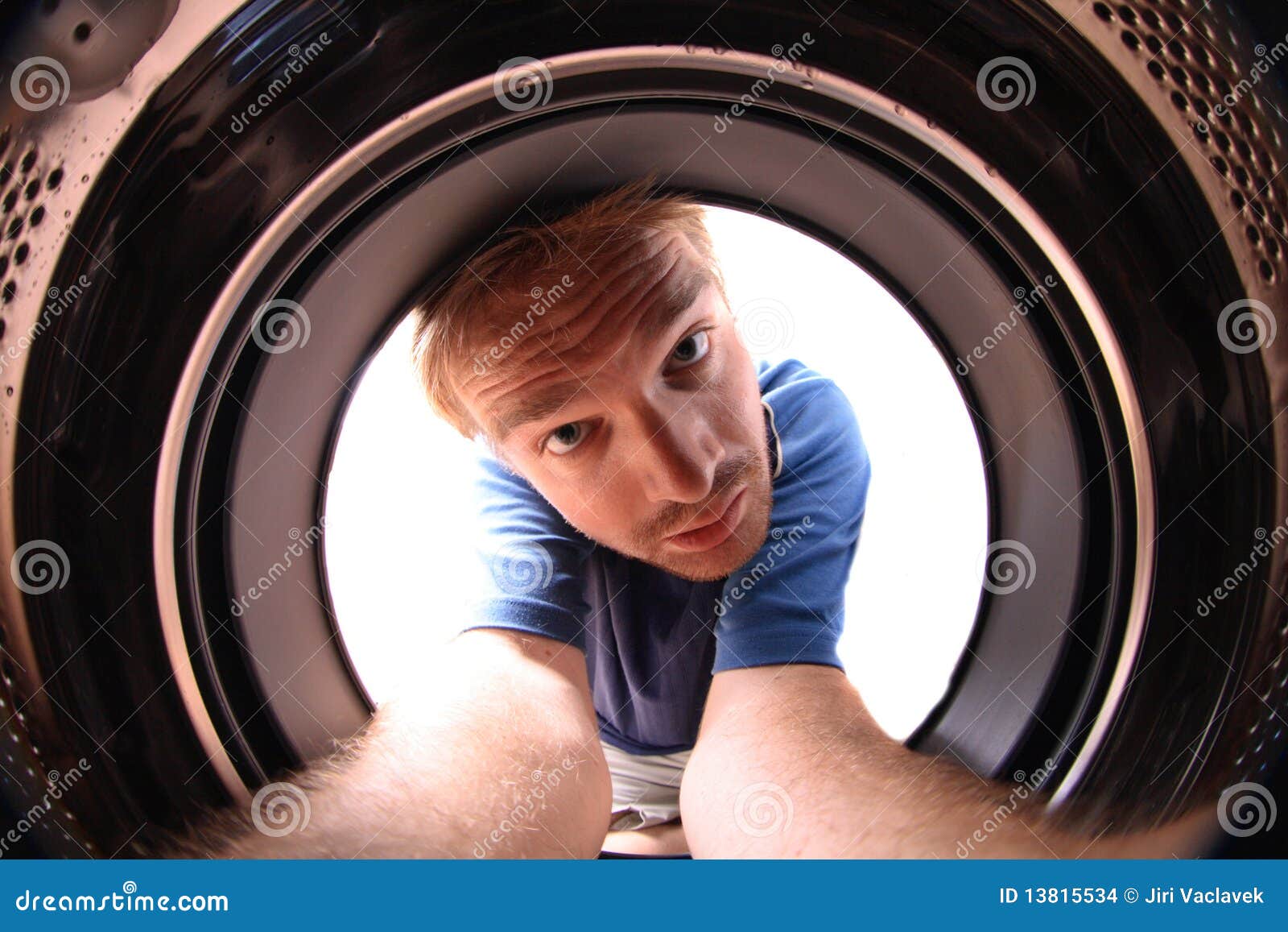 Young man in wash machine stock photo. Image of clothing - 13815534