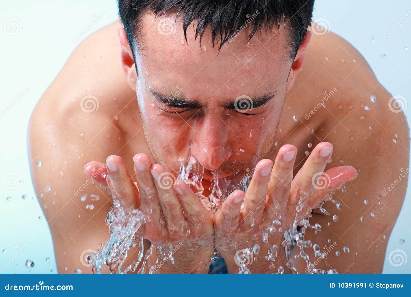 Young man washing face. stock image. Image of lifestyle - 10391991