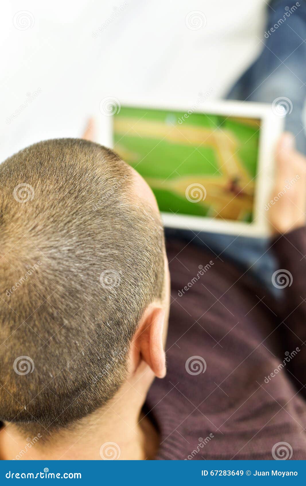 Young Man Watching a Baseball Game in His Tablet Stock Image - Image of ...