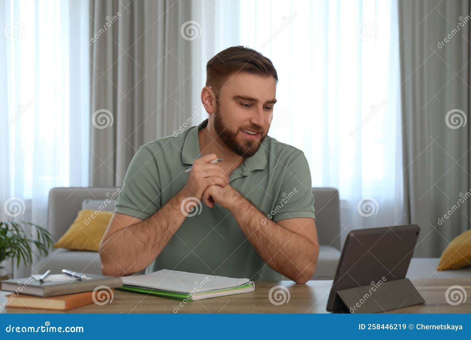 Young Man Watching Online Webinar at Table Indoors Stock Image - Image ...