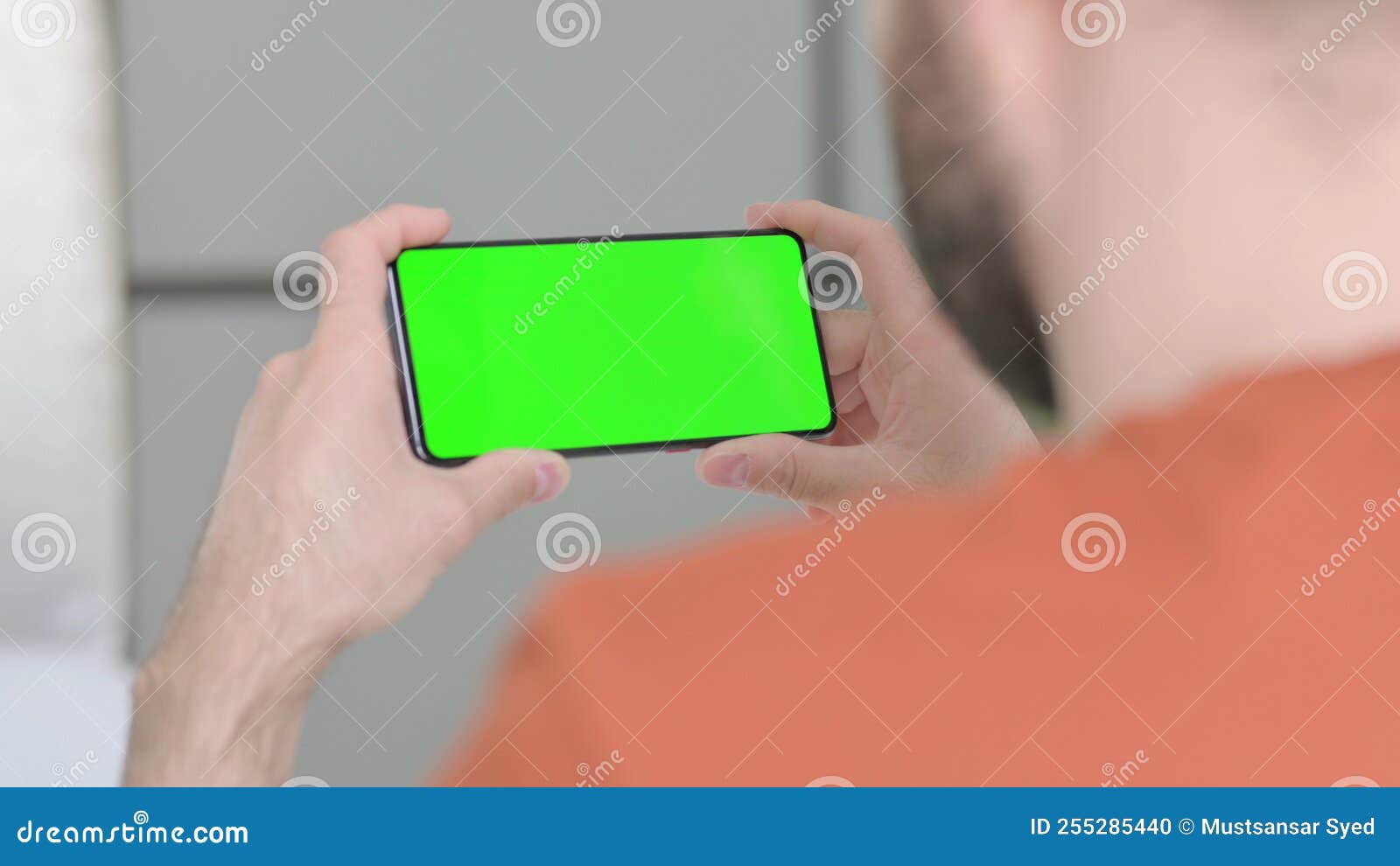 Young Man Watching Smartphone with Chroma Screen Stock Photo - Image of ...