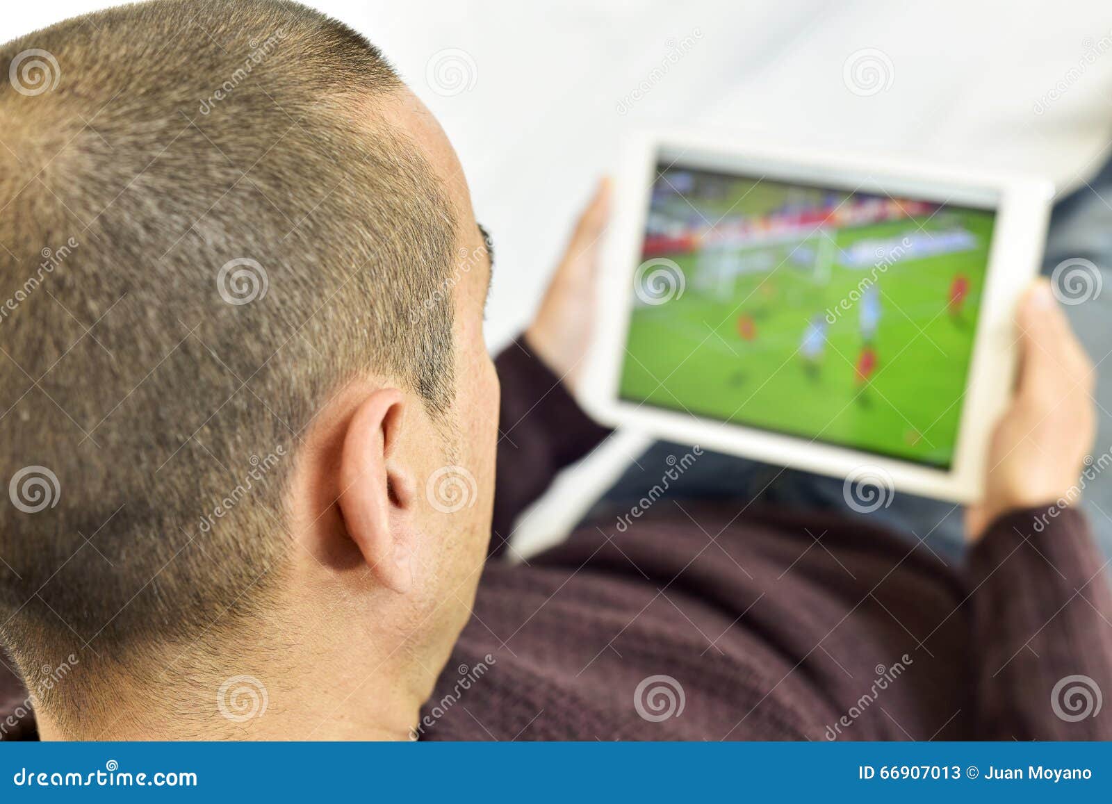 Young Man Watching a Soccer Match in His Tablet Stock Image - Image of ...