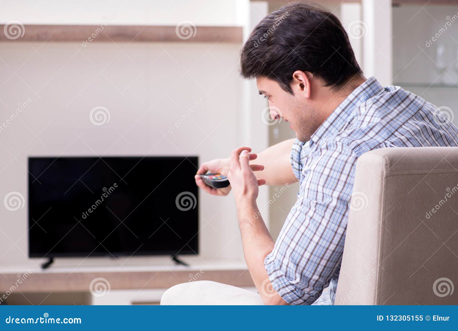The Young Man Watching Tv at Home Stock Image - Image of dependent ...