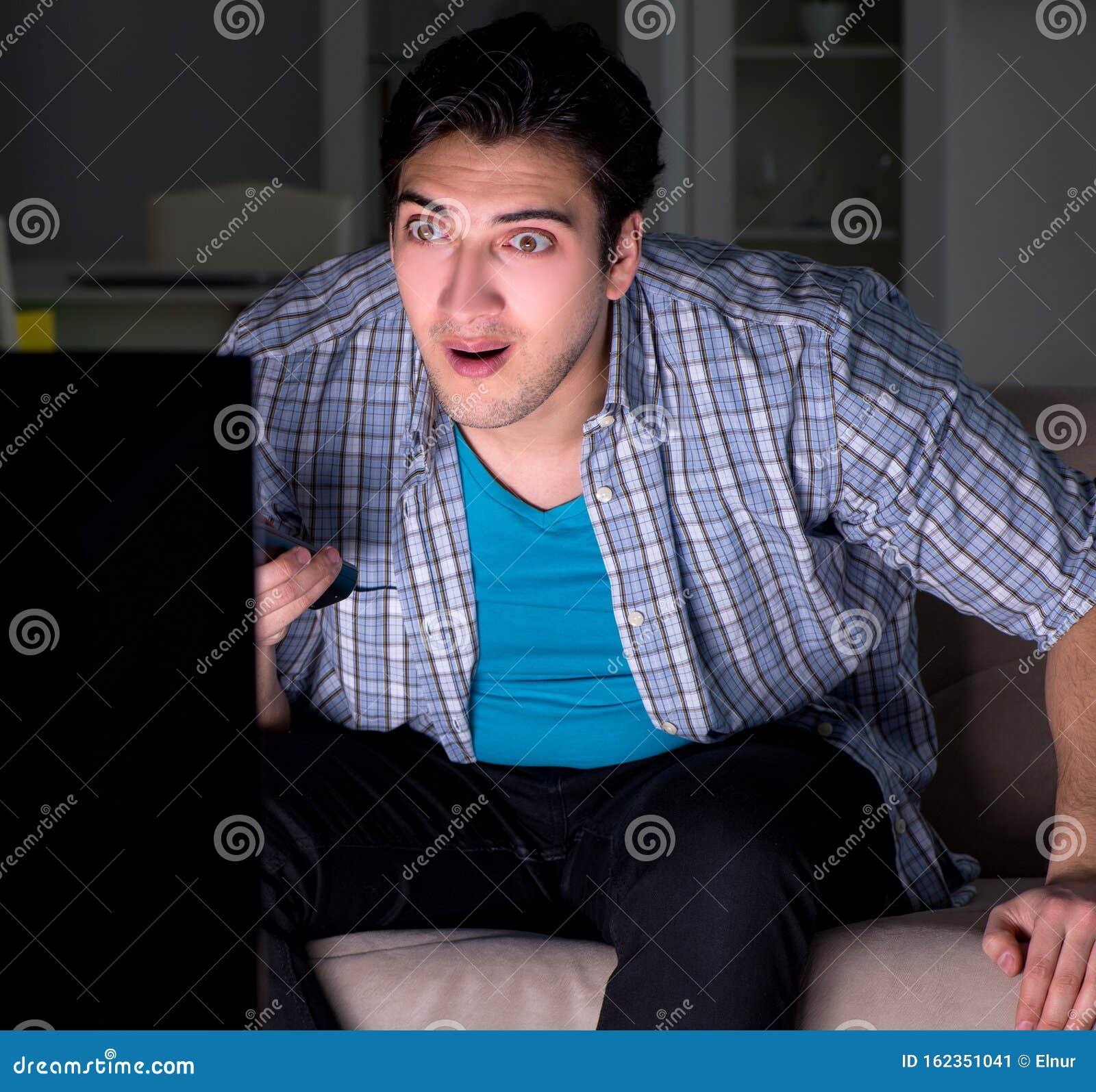 Young Man Watching Tv Late at Night Stock Image - Image of media ...