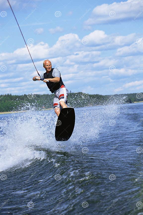 A young man water skiing stock photo. Image of adult, skiing - 6075908