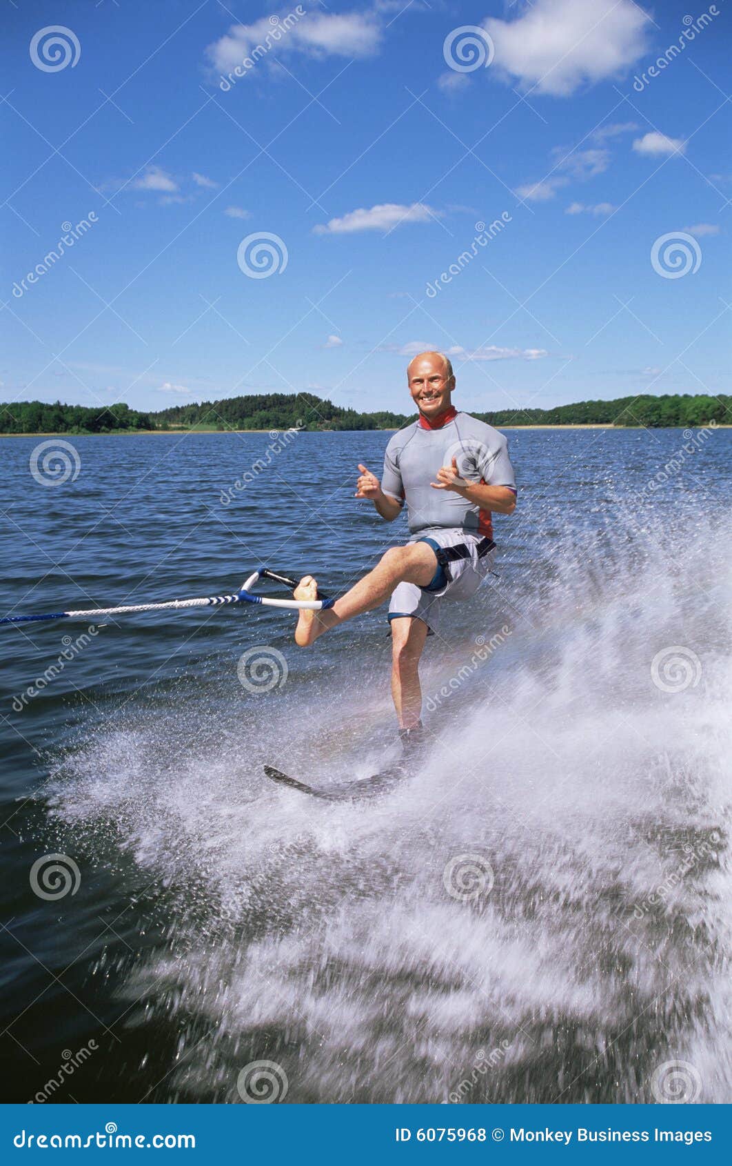 A young man water skiing stock photo. Image of enjoyment - 6075968