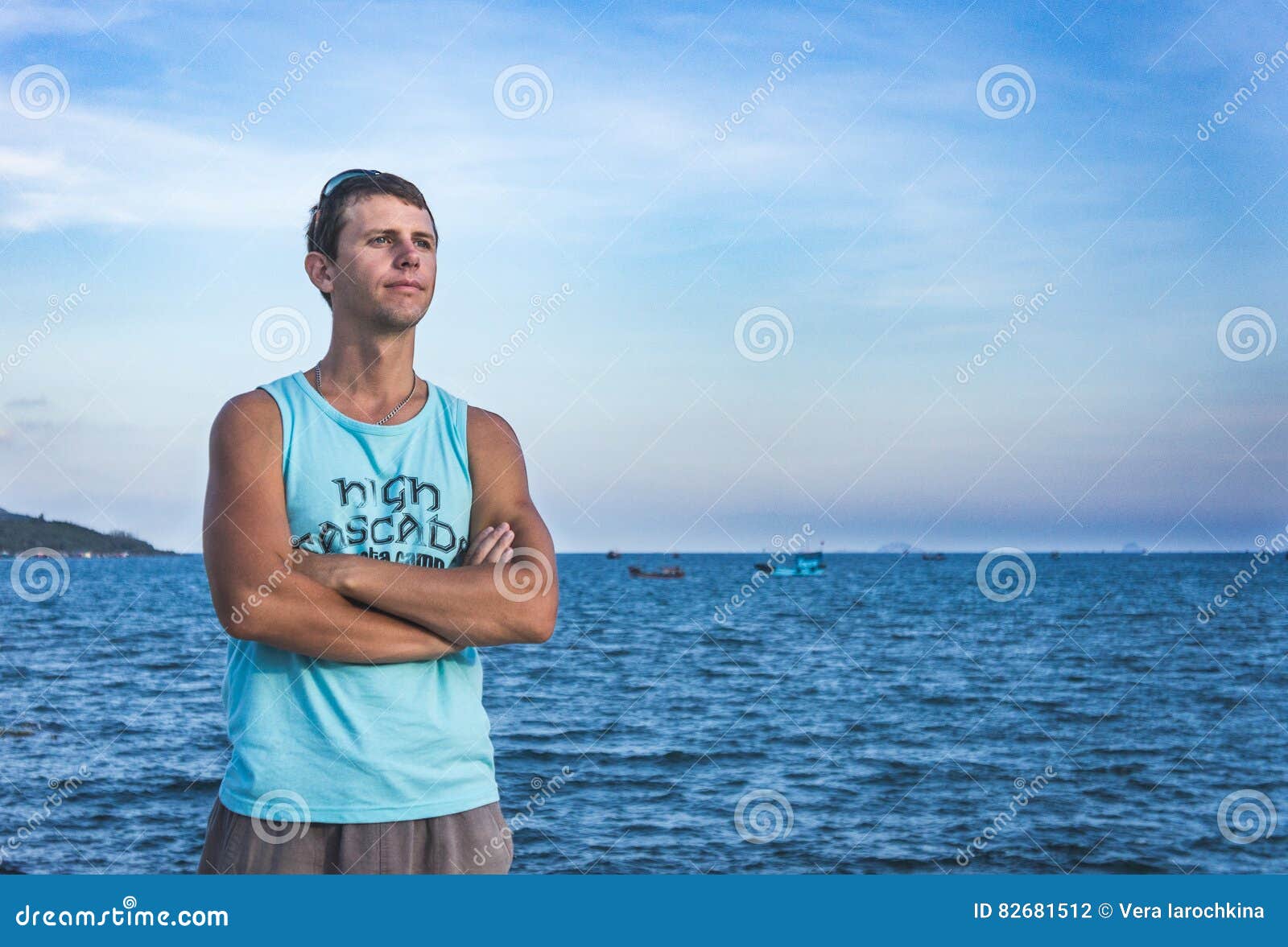 Young Man on the Waterfront Stock Photo - Image of background, beach ...