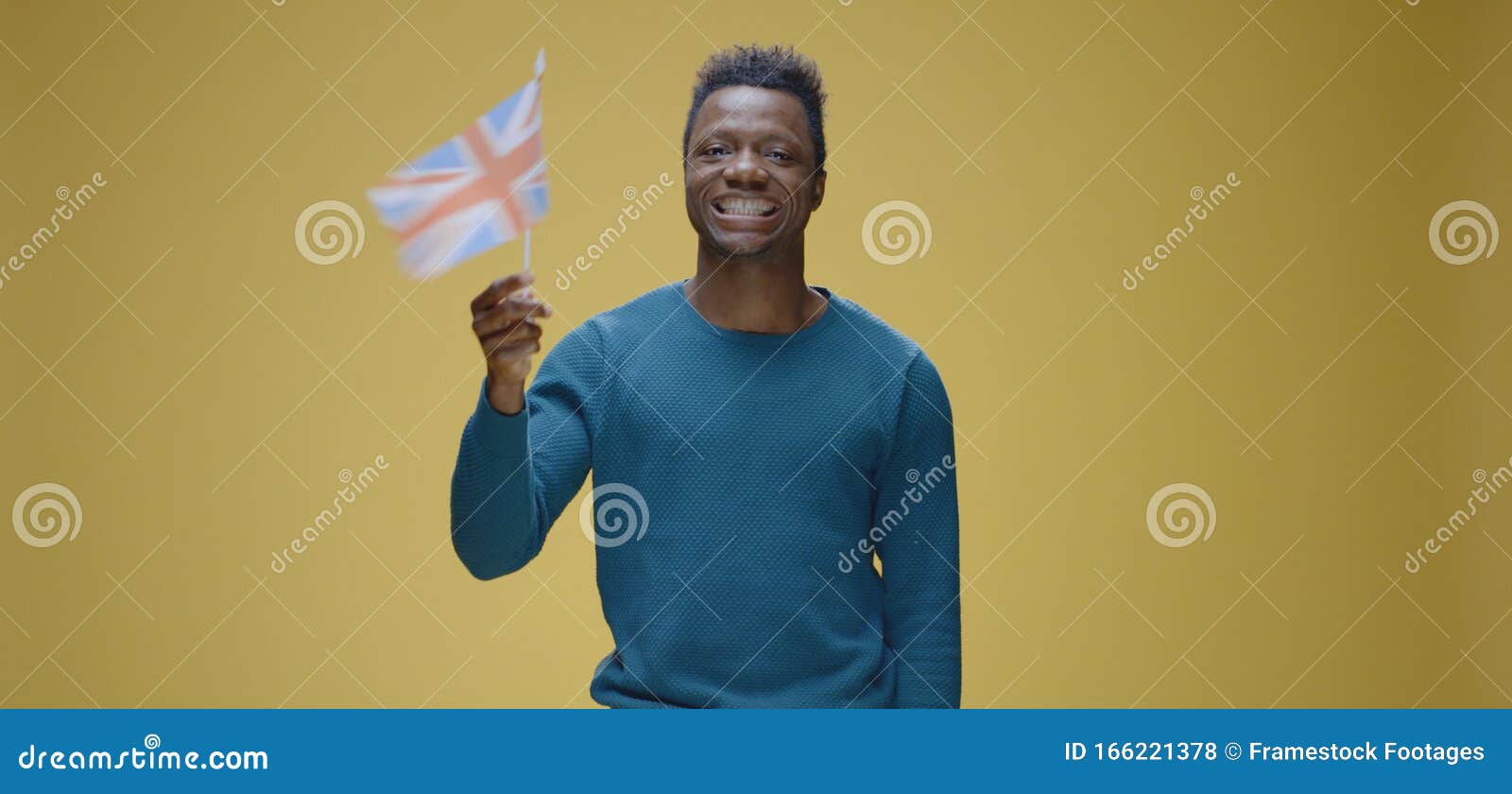 Young Man Waving Union Jack Stock Photo - Image of nationality, waving ...