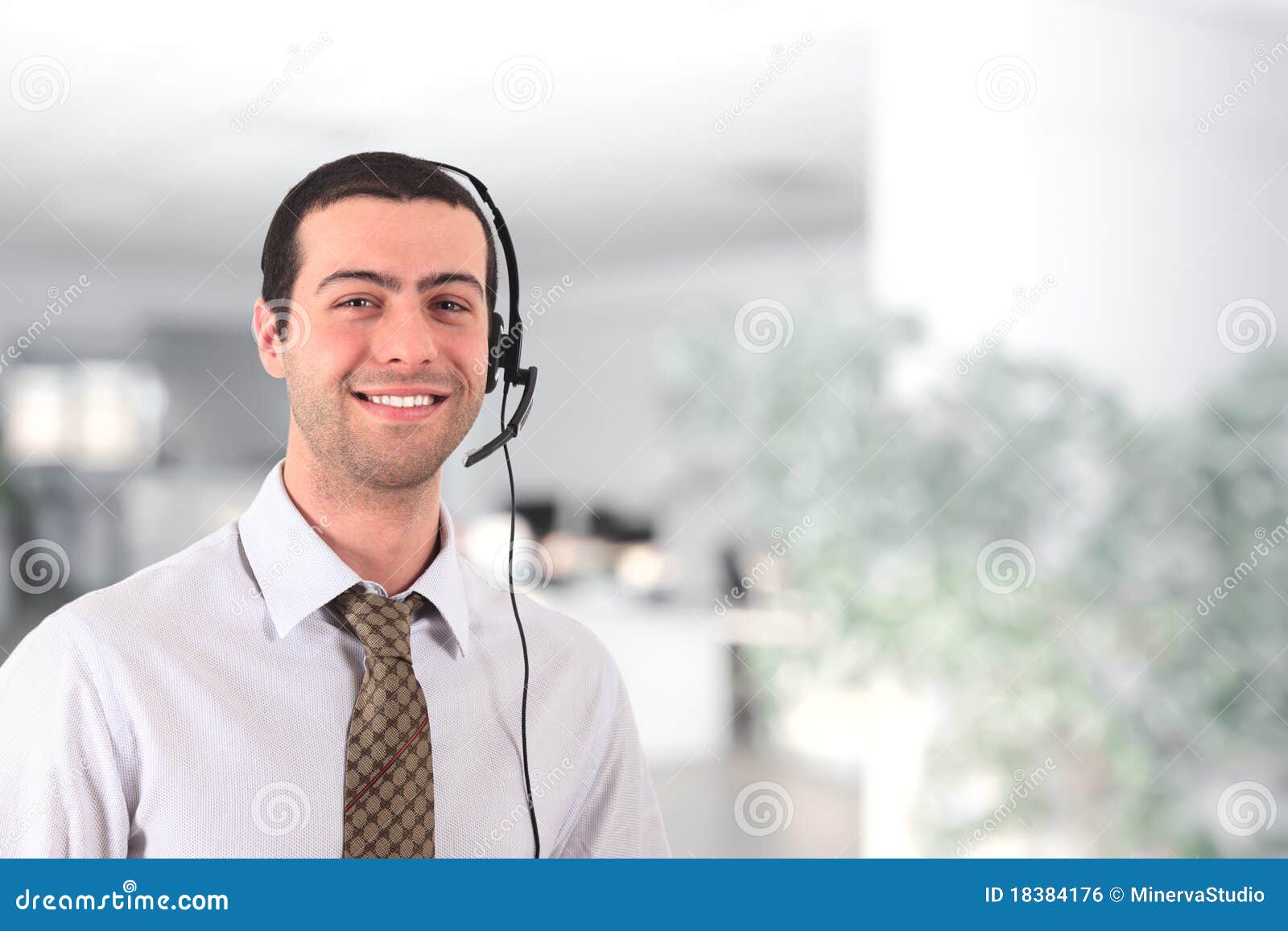 Young man wearing headset stock photo. Image of corporate - 18384176