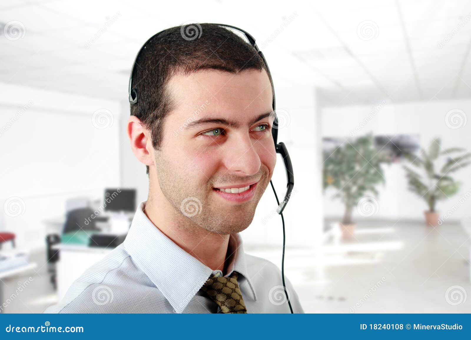 Young Man Wearing a Headset at the Office Stock Photo - Image of ...