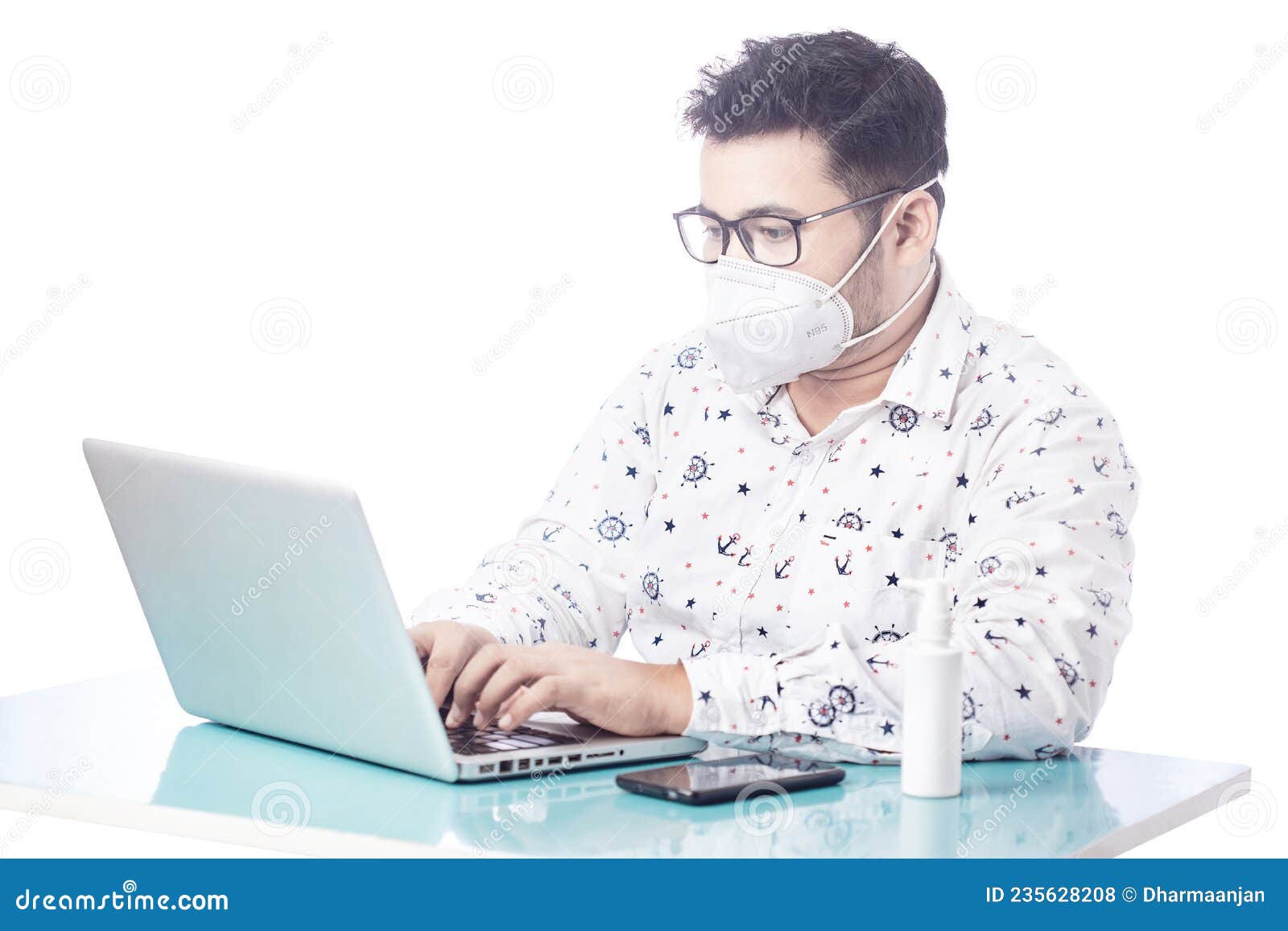 Young Man Wearing Mask Typing on Laptop Keyboard Stock Photo - Image of ...