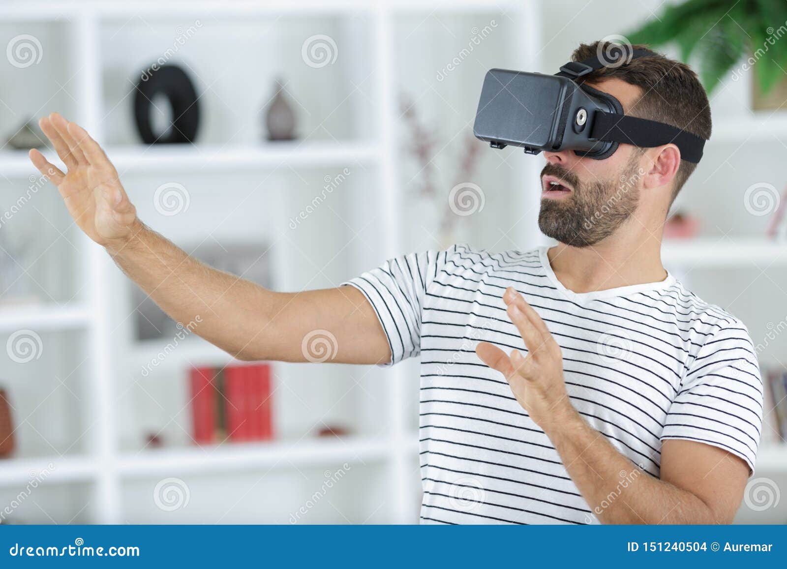 Young Man Wearing Vr Headset and Experiencing Virtual Reality Stock ...