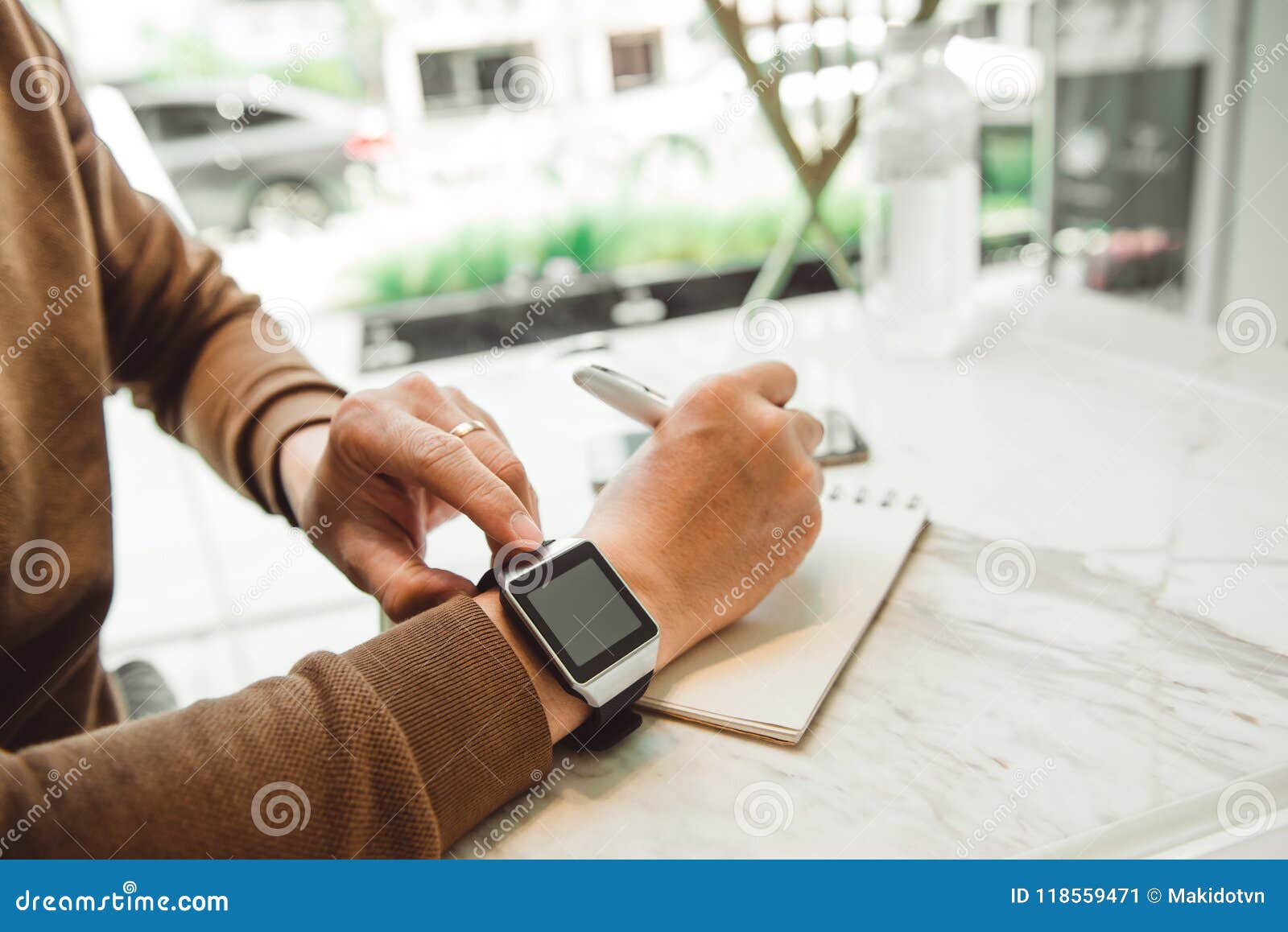 Young Man Wears Smart Watch Working on Table Stock Image - Image of ...