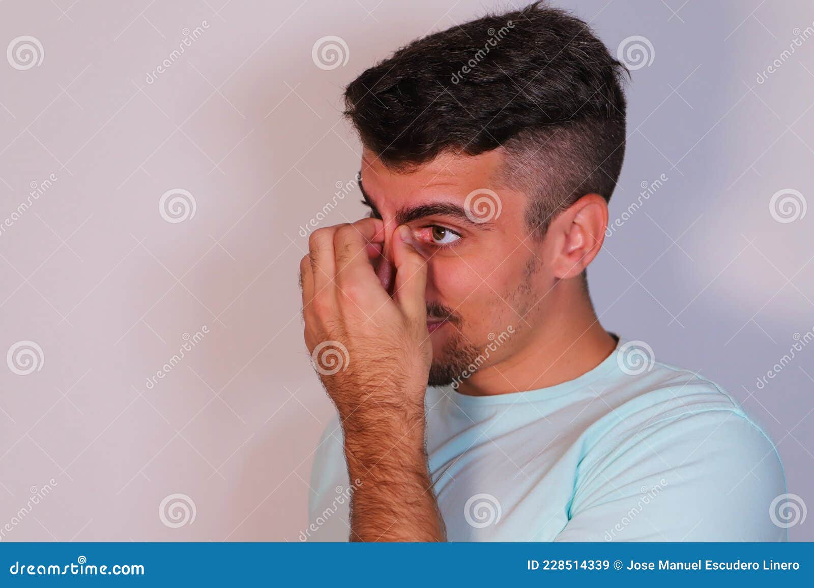 Young Man on a White Background Looking Disappointed and Disappointed ...