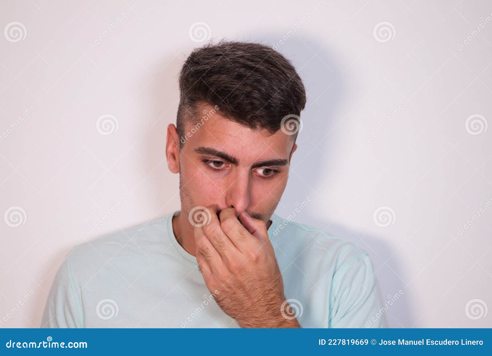 Young Man on White Background Looking with Questioning Face. Concept ...