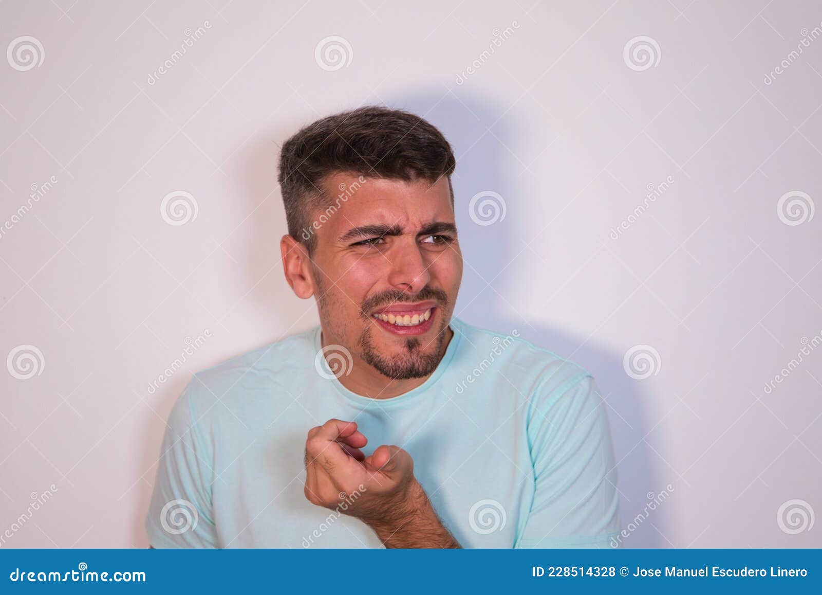 Young Man on White Background Looking with Questioning Face. Concept ...