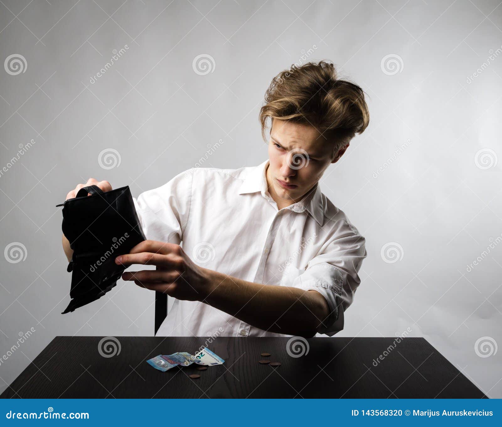 Young Man in White and Empty Wallet Stock Photo - Image of jobless ...