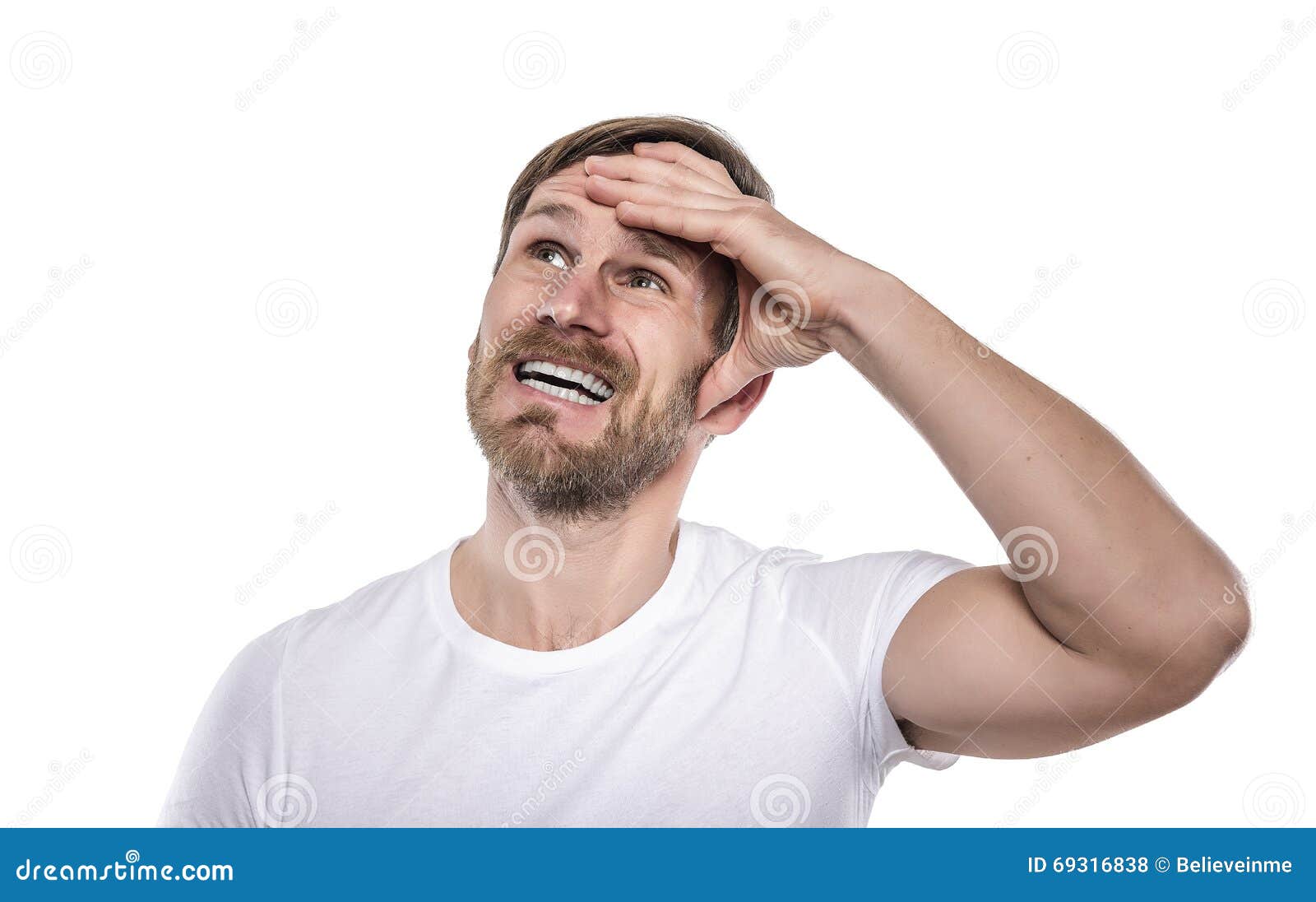 Young Man in a White Shirt is Thinking Intensely. Stock Photo - Image ...