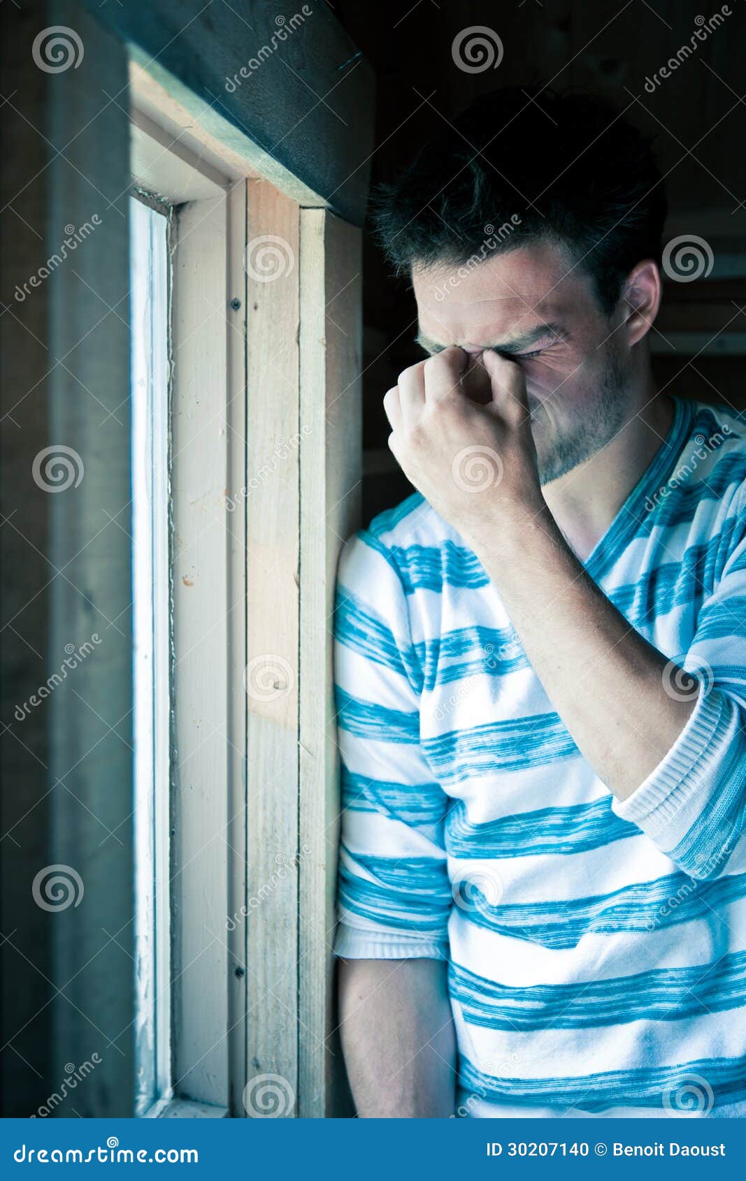 Young man at the window stock photo. Image of comfort - 30207140