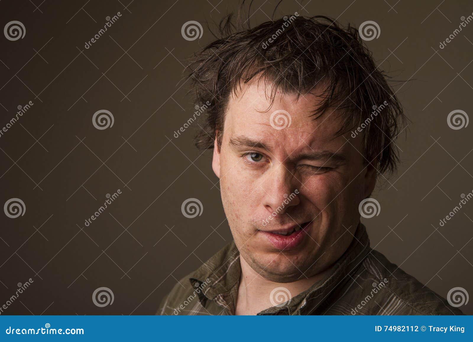 Young man winking stock photo. Image of person, smiling - 74982112