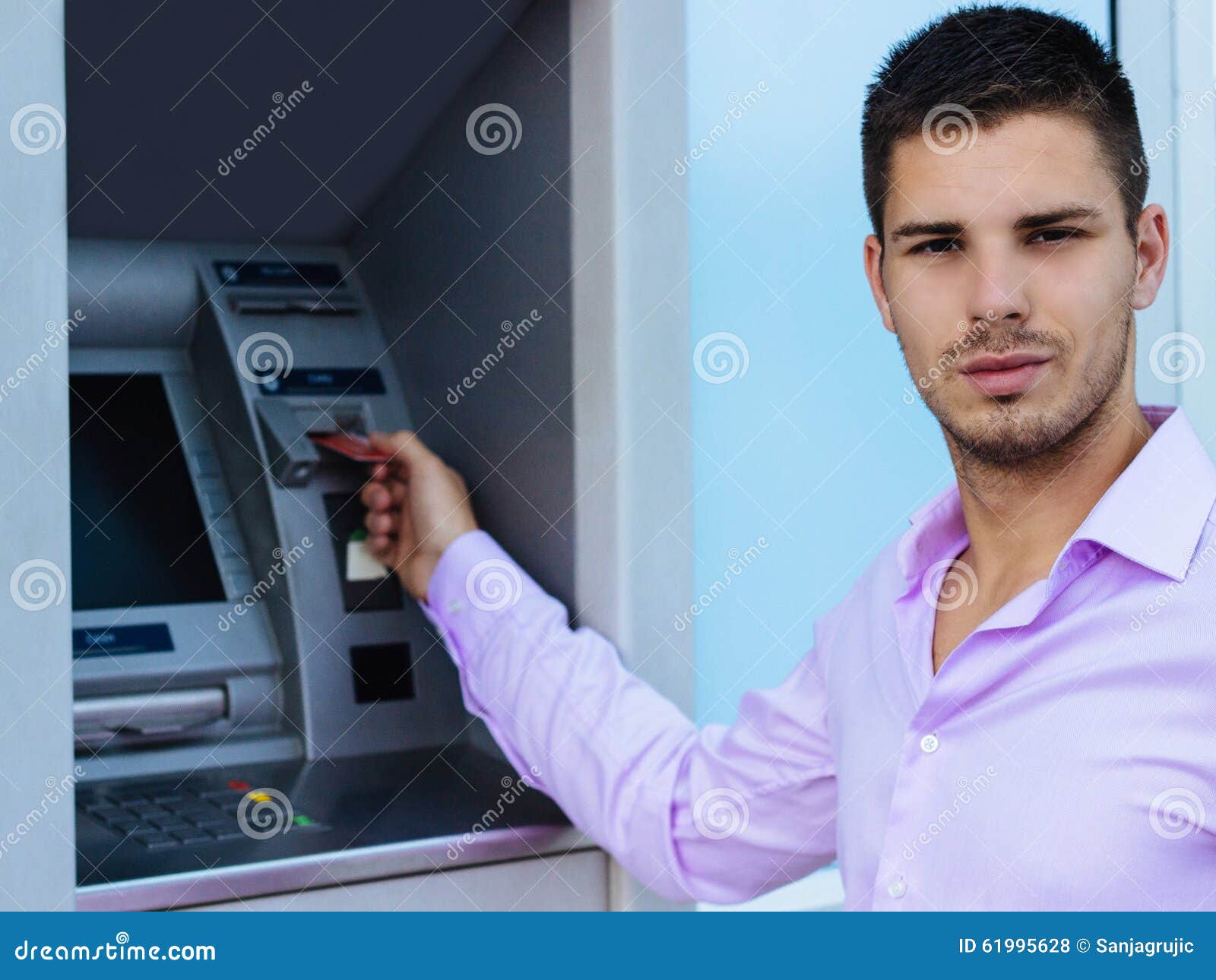 Young Man Withdrawing Money Stock Photo - Image of deposit, lifestyles ...
