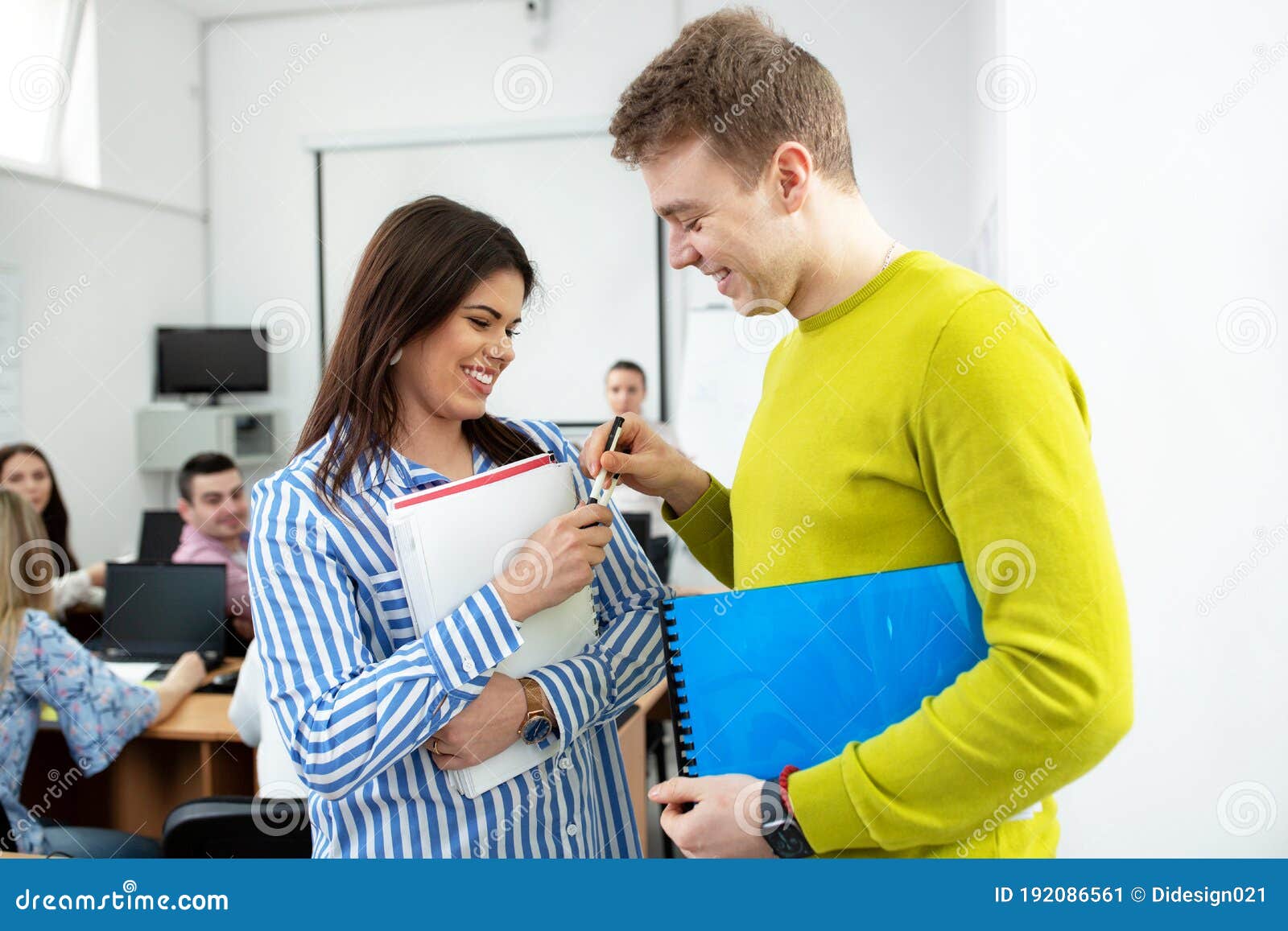 Young Man and a Young Woman Having Fun during Class Break Stock Image ...