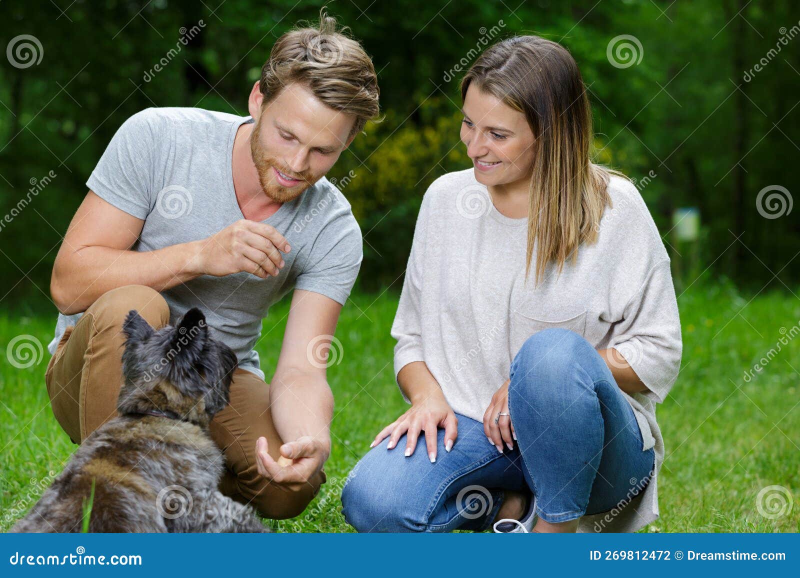 Young Man and Woman in Park with Dog Stock Photo - Image of owner ...