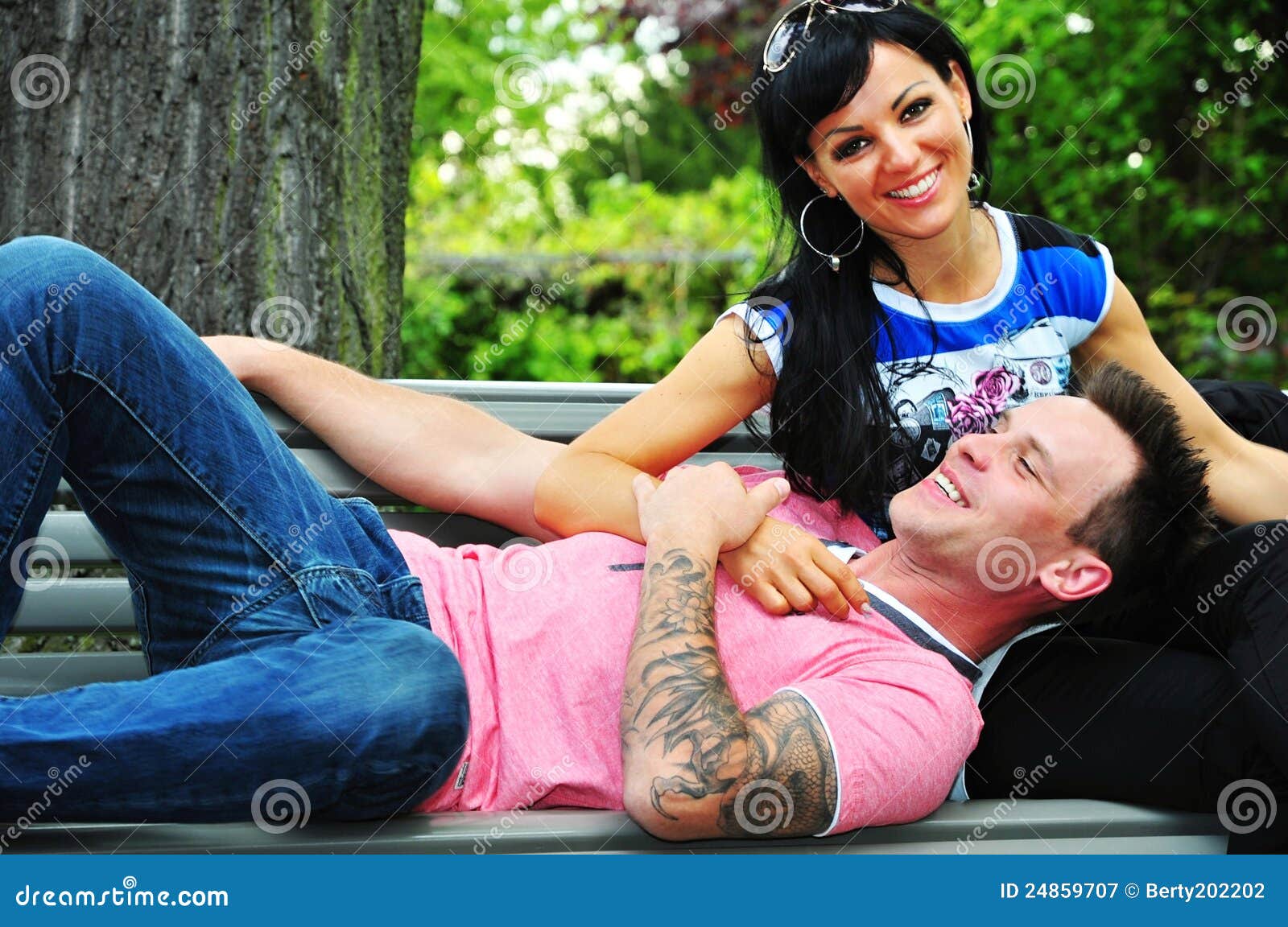 Young Man and Woman Romance Stock Image - Image of romance, bench: 24859707