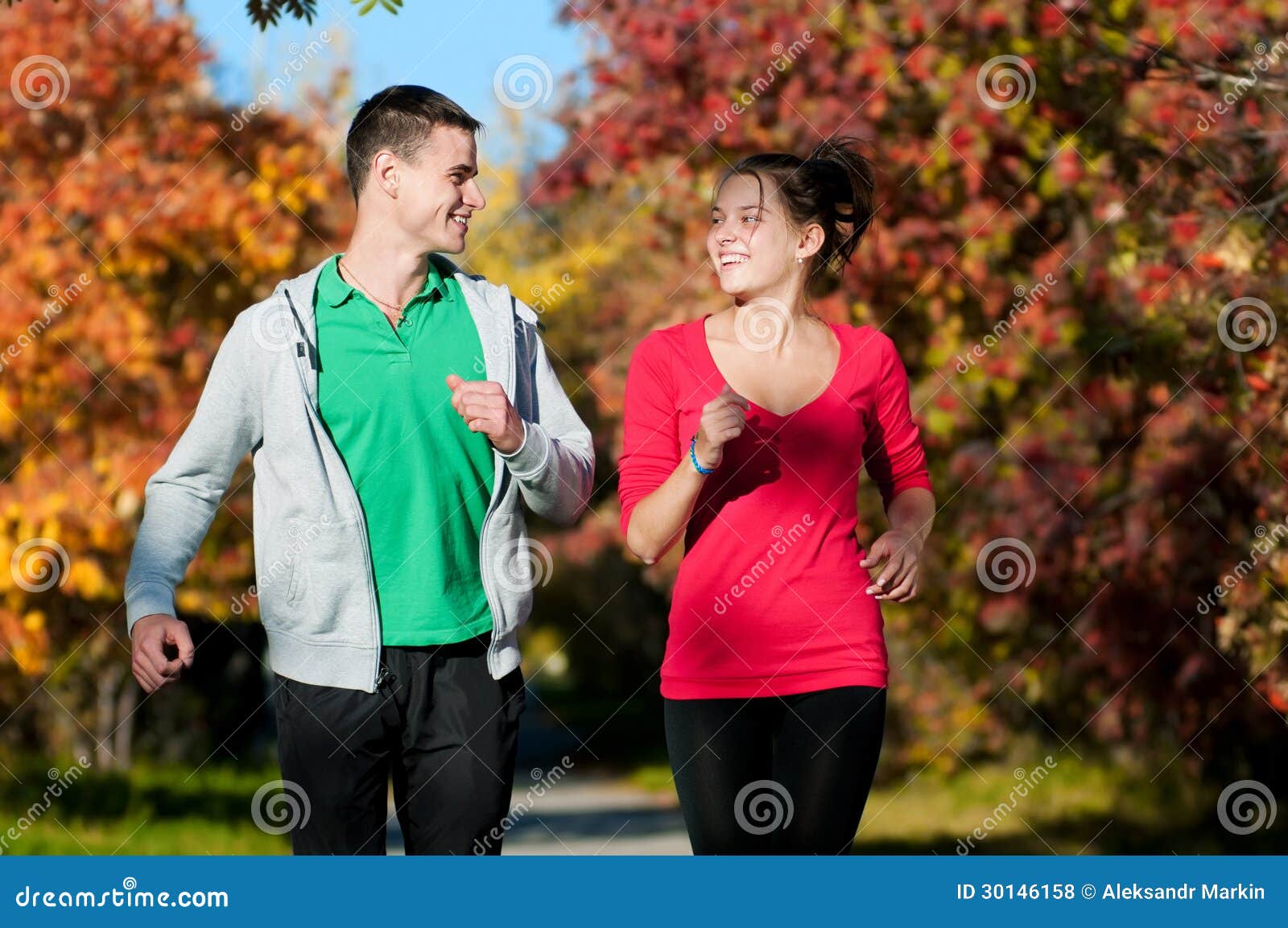 Young Man and Woman Running Stock Photo - Image of jogger, fitness ...