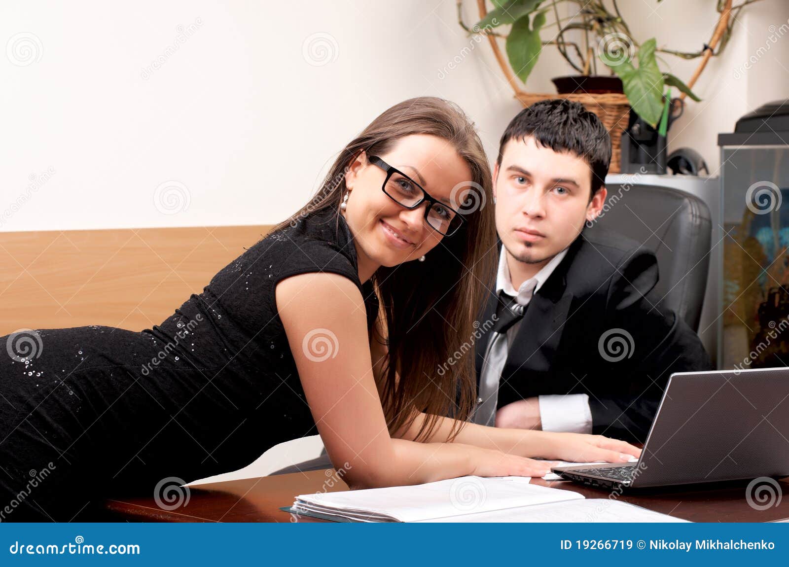 Young Man and Woman Working Together Stock Image - Image of employer ...