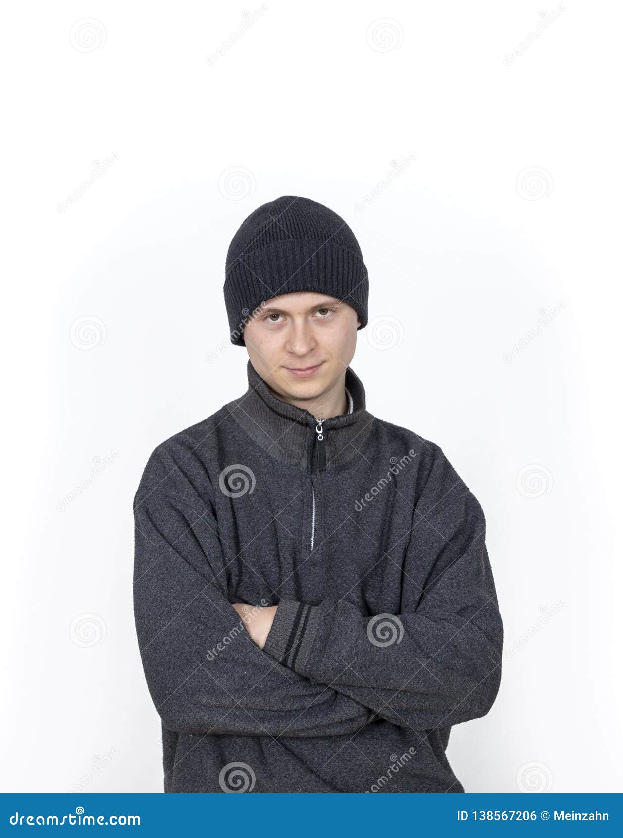 Young man with wooly hat stock photo. Image of smile - 138567206