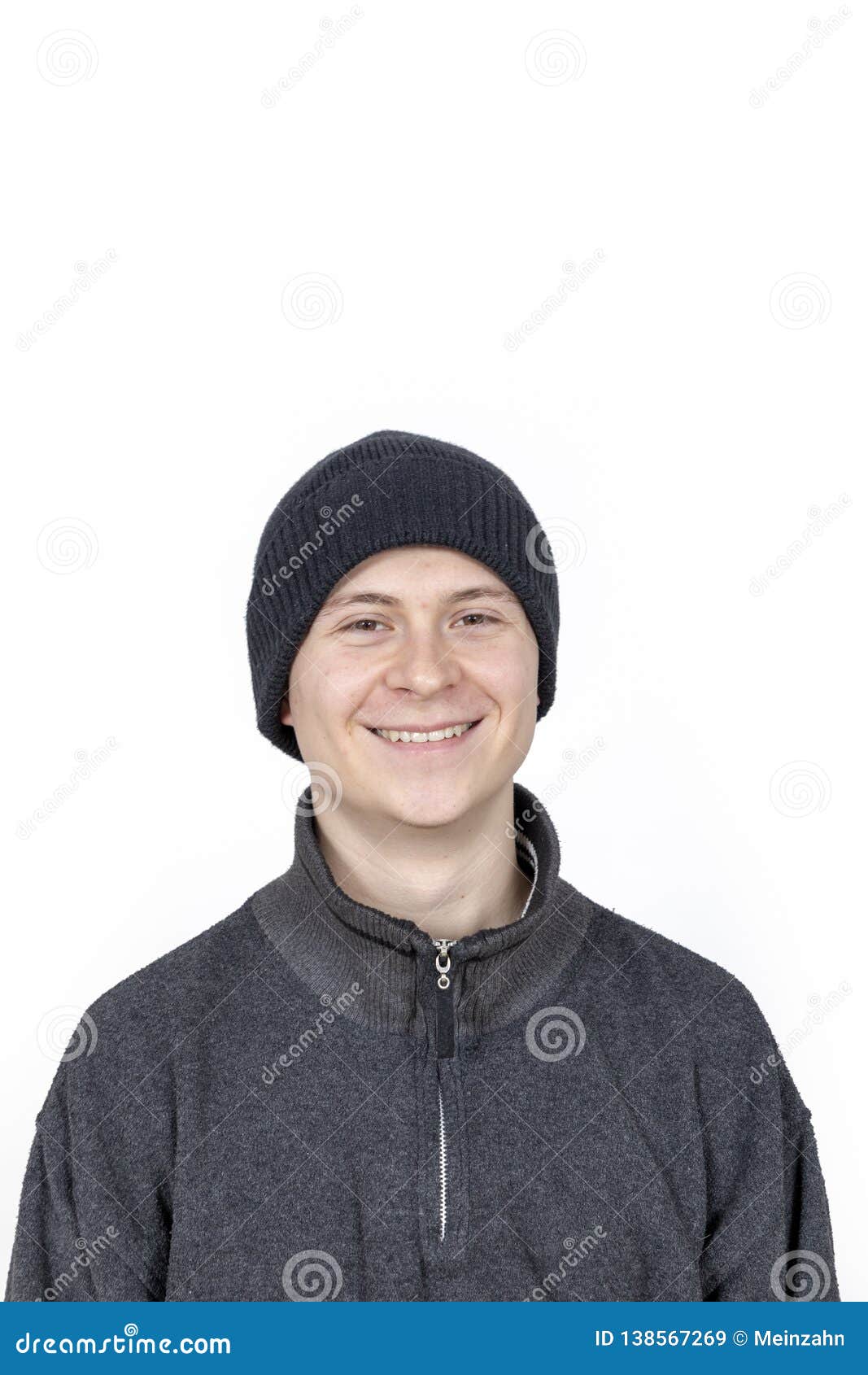 Young man with wooly hat stock image. Image of toothy - 138567269