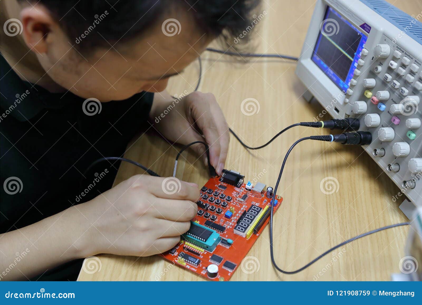 Electronic Devices and Circuit Board ，male Electronic Engineer Using ...