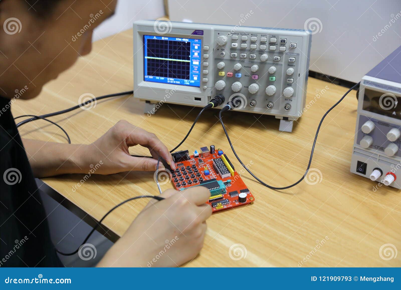 Electronic Devices and Circuit Board ï¼Œmale Electronic Engineer Using ...