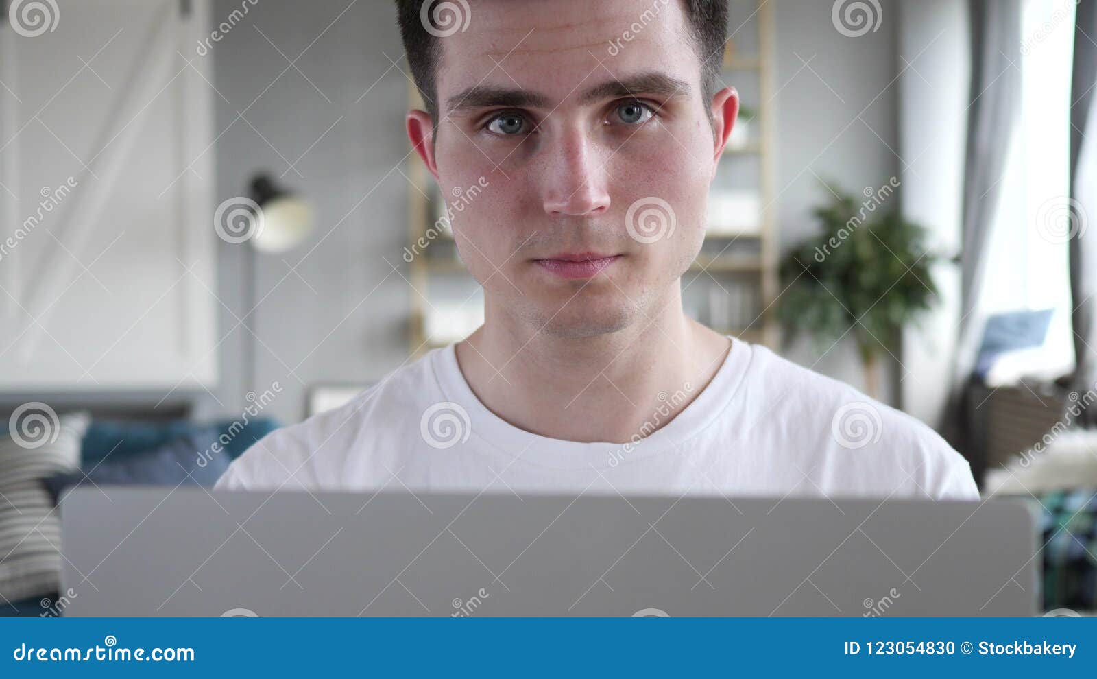 Young Man at Work stock photo. Image of programming - 123054830