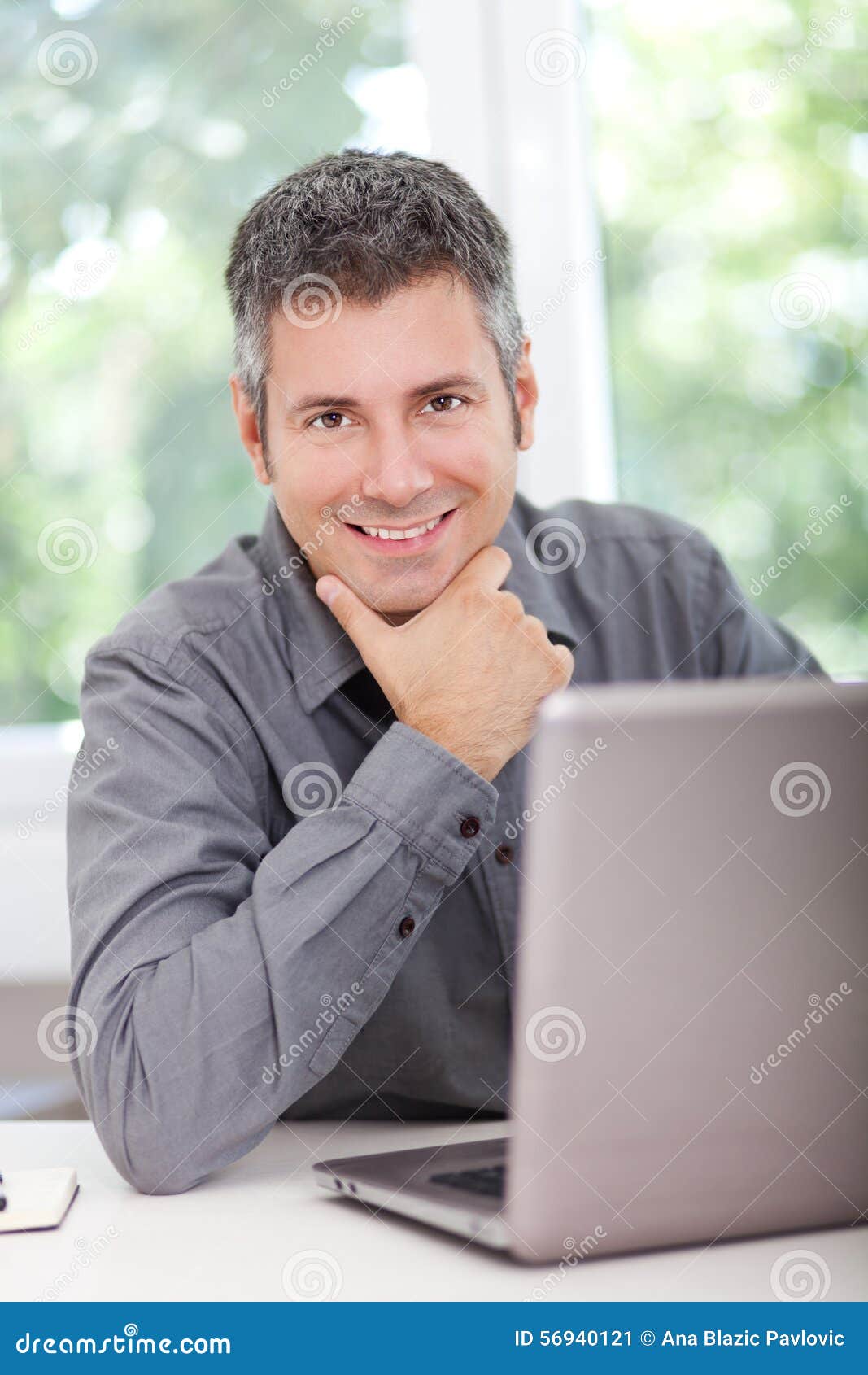 Young man at work stock image. Image of career, laptop - 56940121