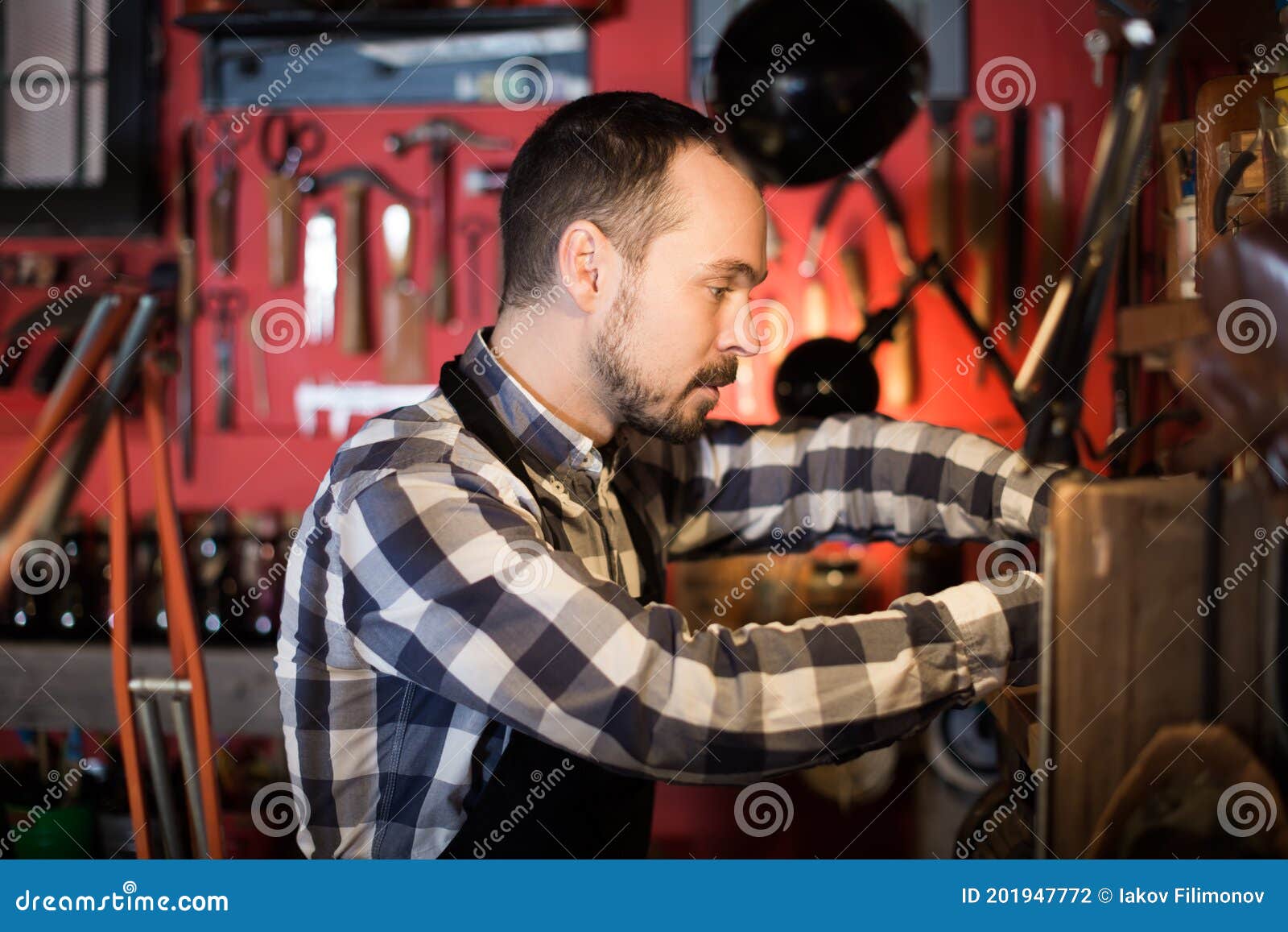 Young Man Worker Demonstrating His Workplace Stock Photo - Image of ...