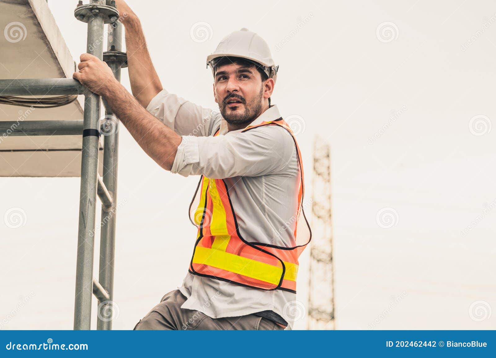 Young Man Worker or Engineer Climb Ladder. Stock Photo - Image of ...