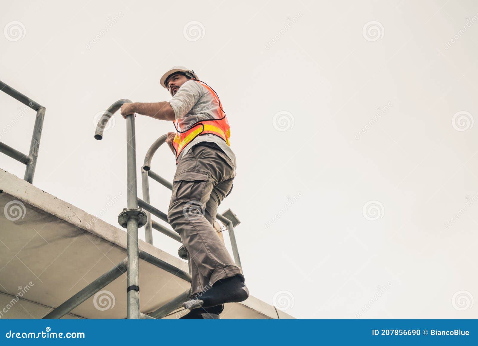Young Man Worker or Engineer Climb Ladder. Stock Photo - Image of ...
