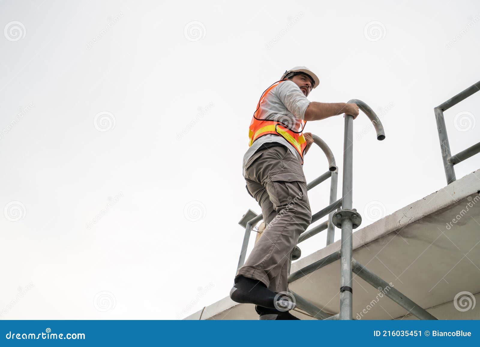 Young Man Worker or Engineer Climb Ladder. Stock Image - Image of ...