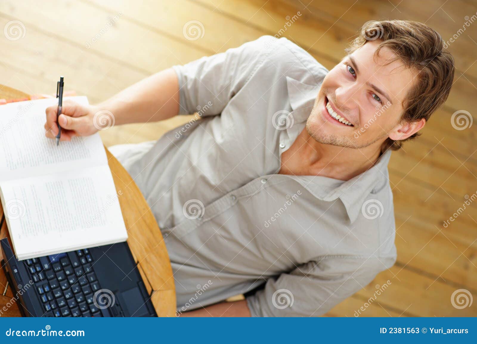 Young man working stock image. Image of notebook, businessman - 2381563