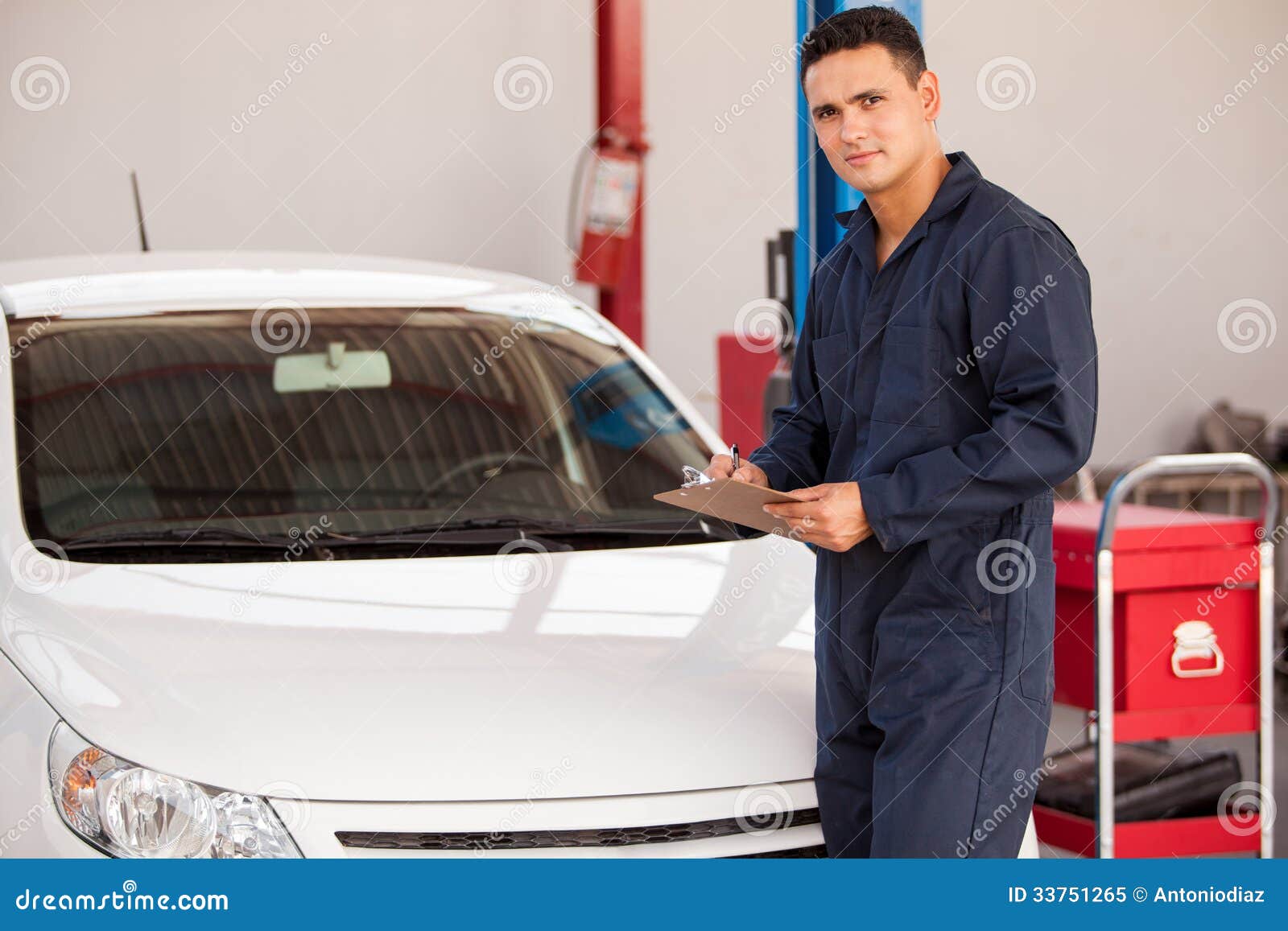 Young Man Working in an Auto Shop Stock Image - Image of vehicle ...