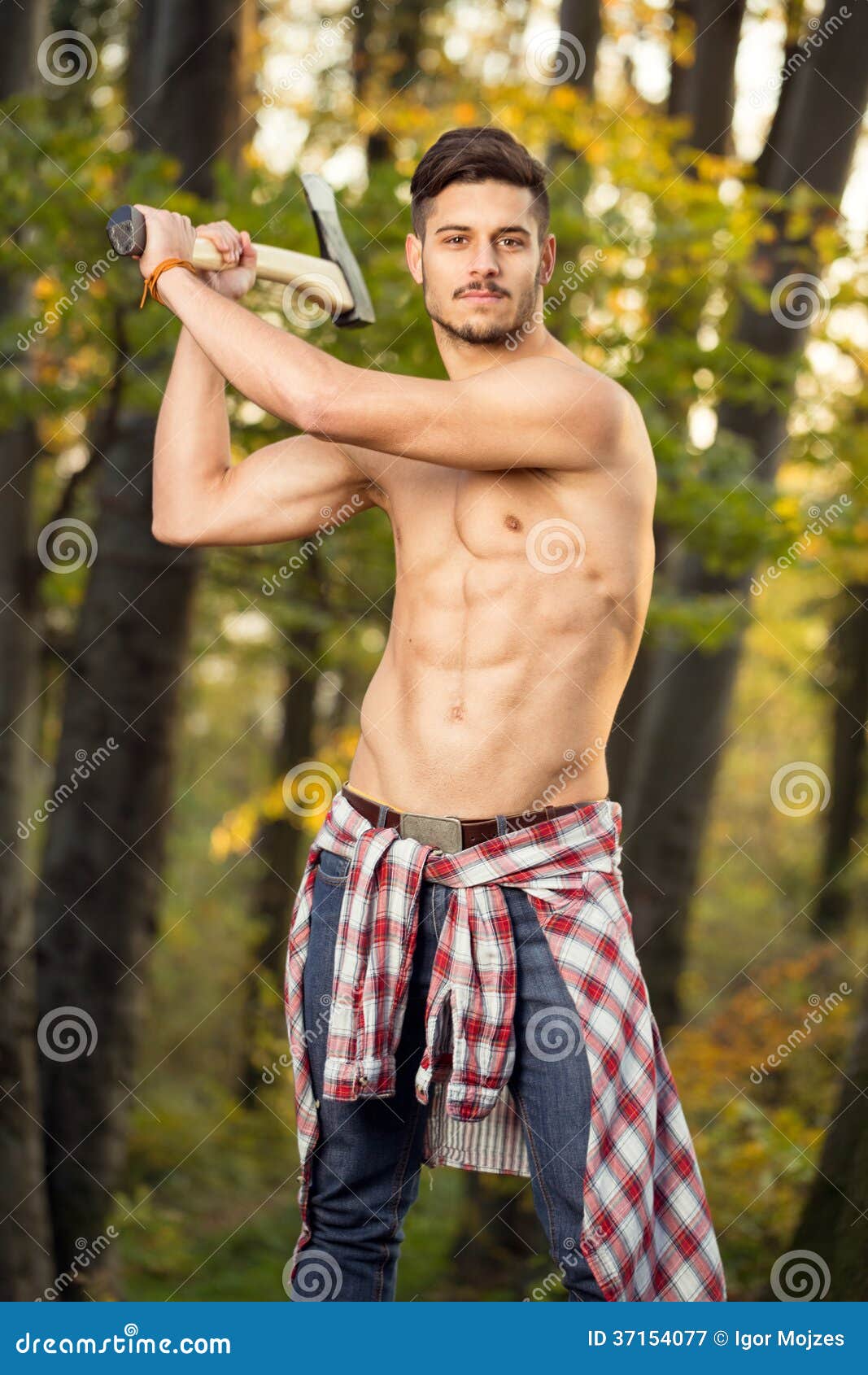 Young man working with axe stock image. Image of professional - 37154077