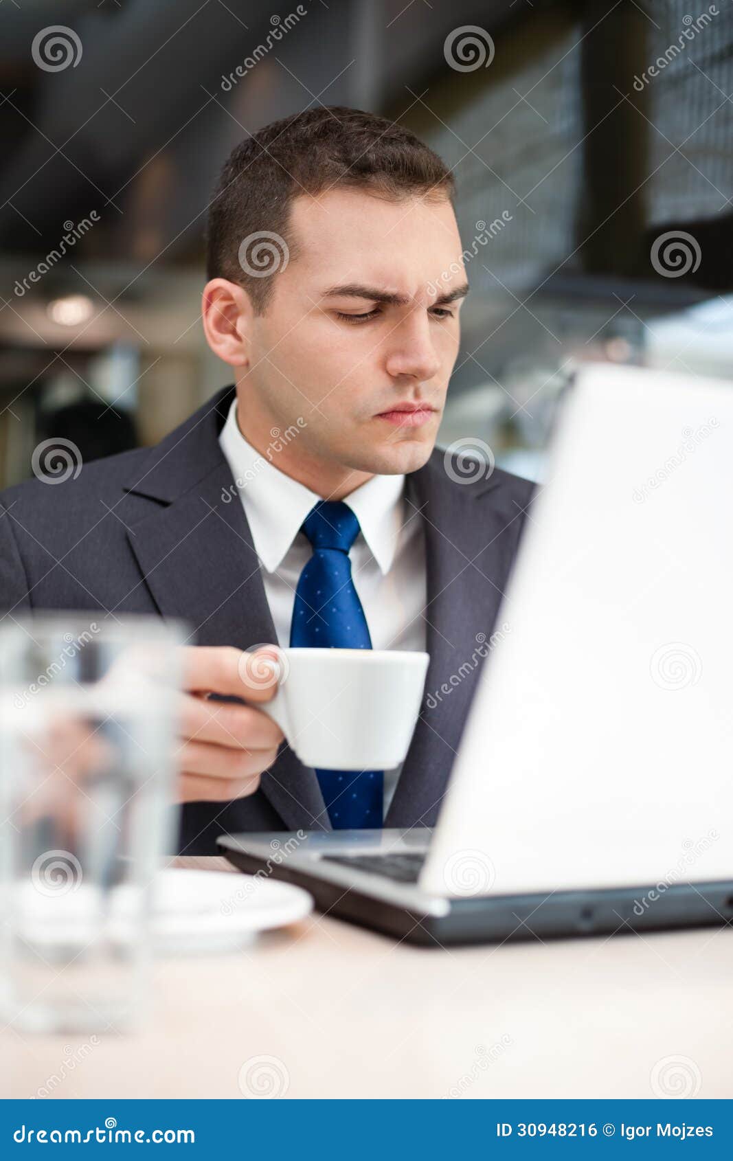Young man working in cafe stock photo. Image of satisfaction - 30948216