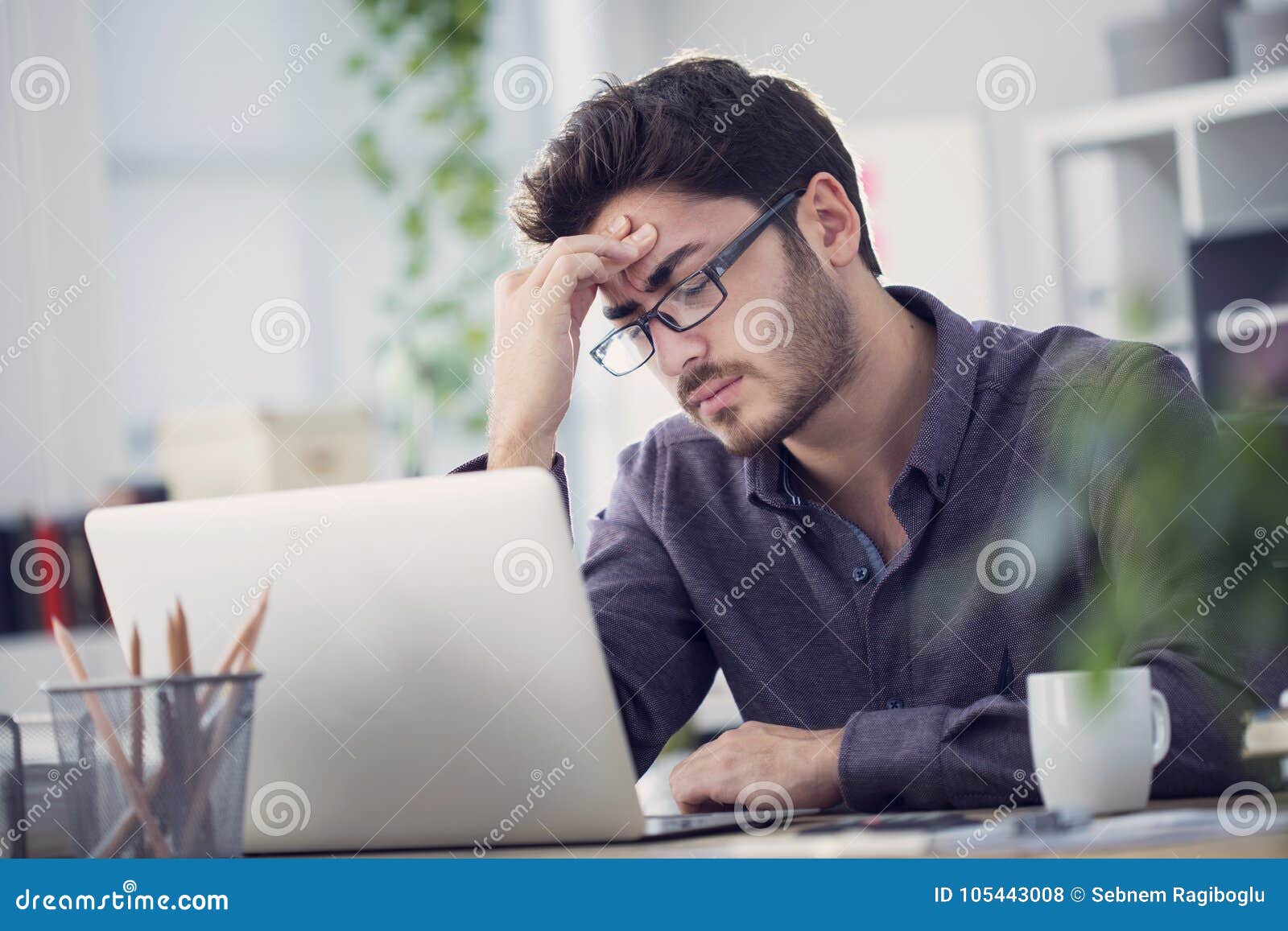 Young Man Working on Computer and Having Headache Stock Photo - Image ...