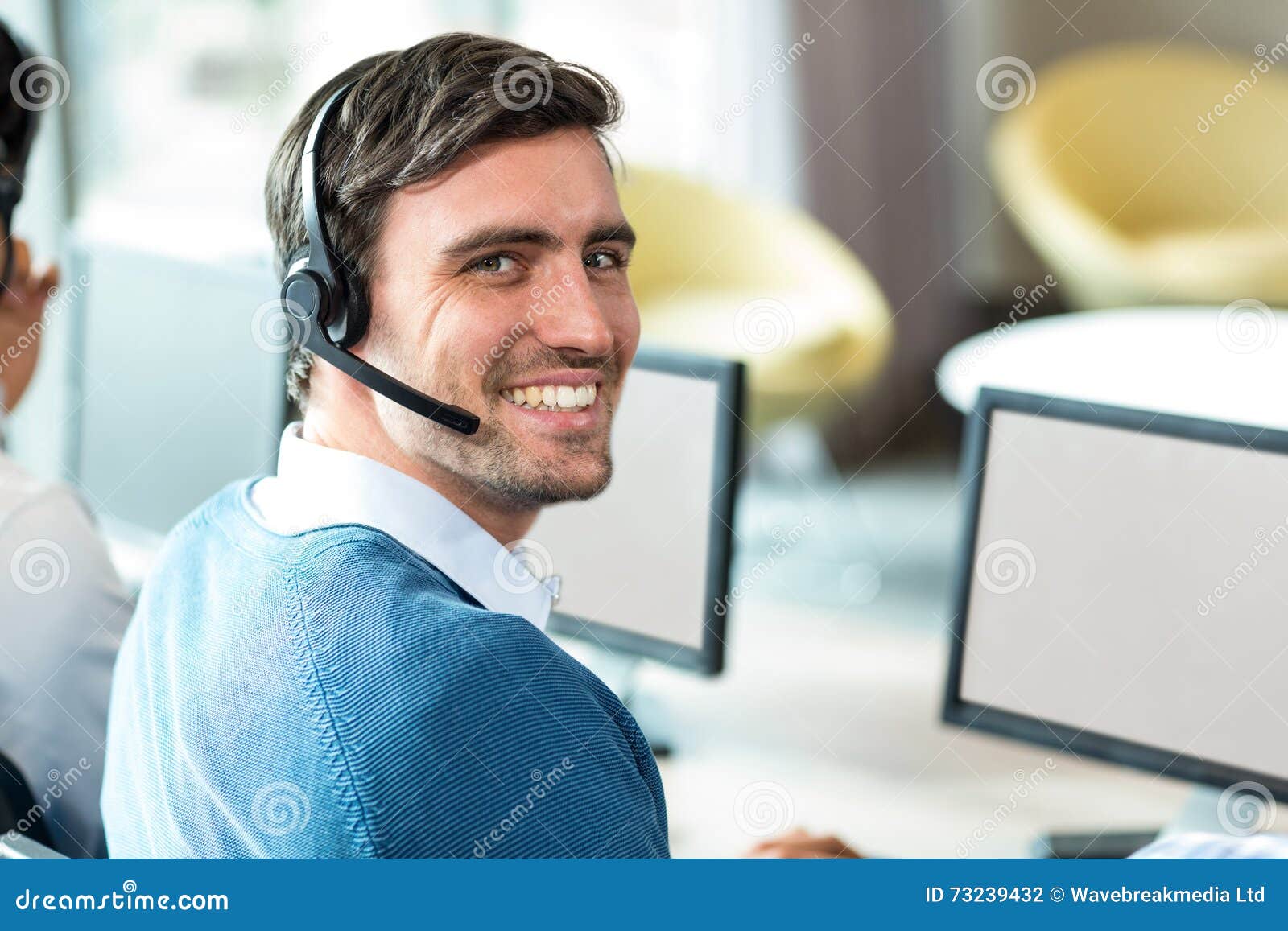 Young Man Working on Computer with Headset Stock Photo - Image of ...