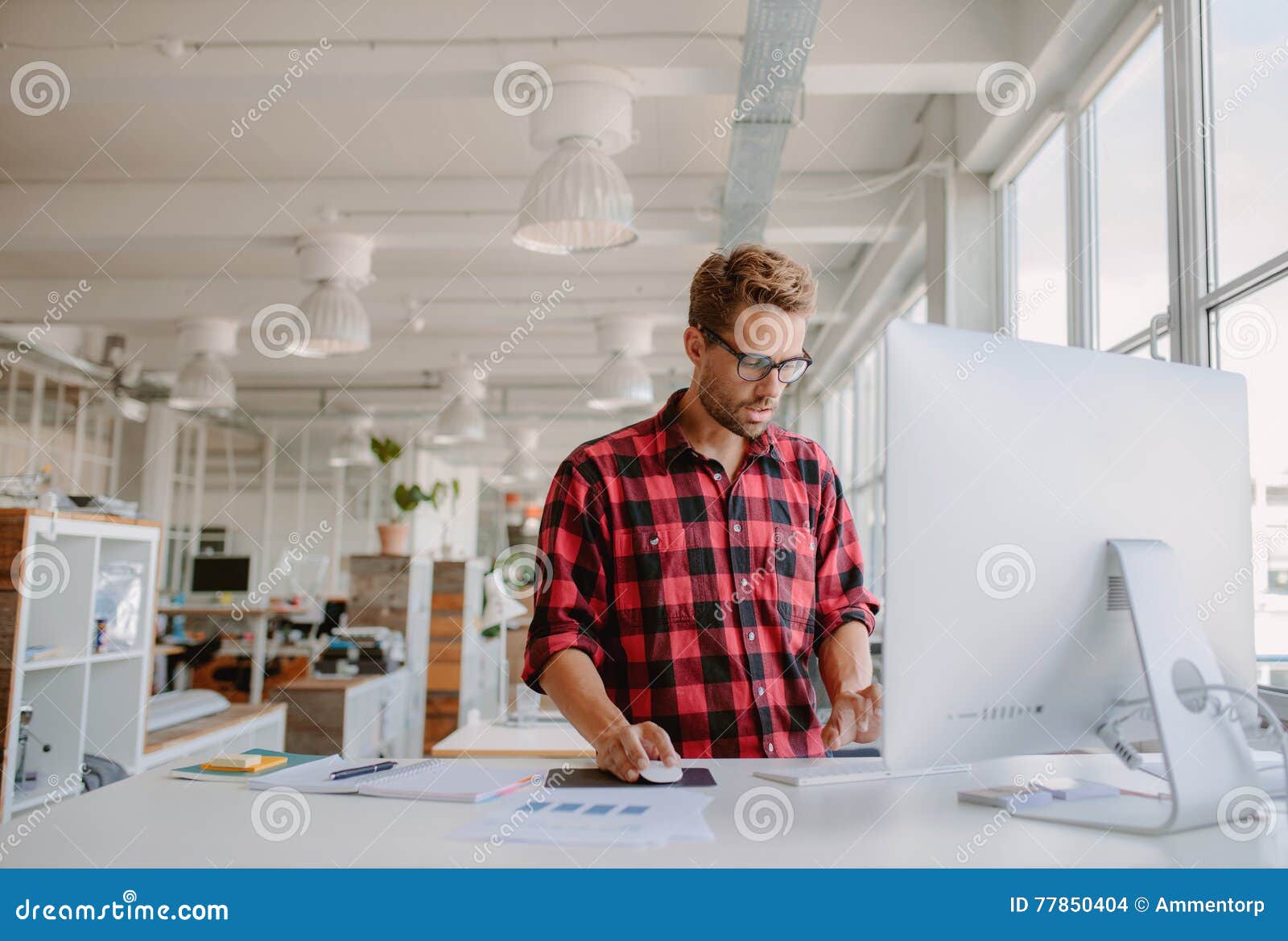Young Man Working on Computer in Modern Office Stock Photo - Image of ...