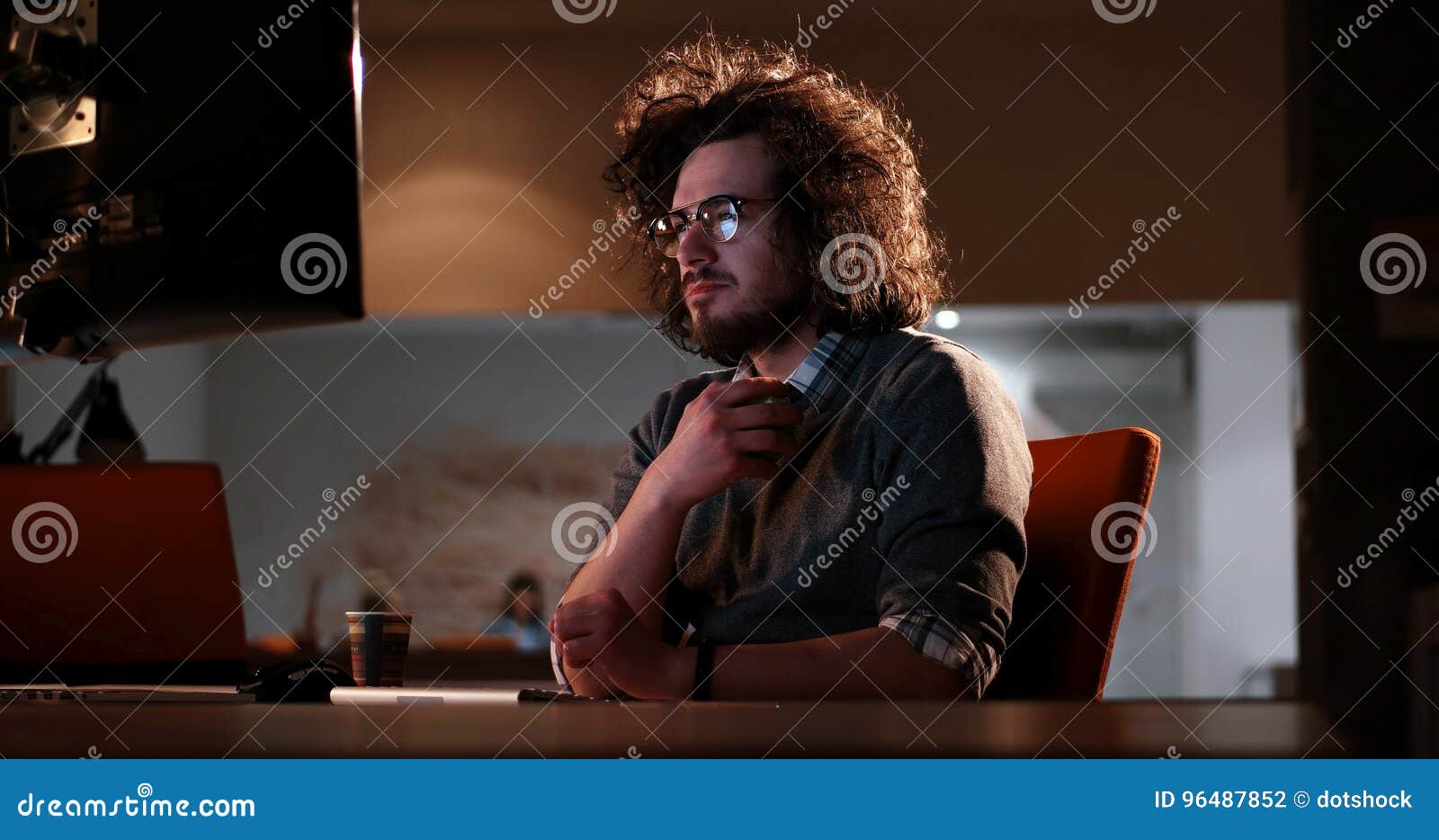 Man Working on Computer in Dark Office Stock Photo - Image of desktop ...