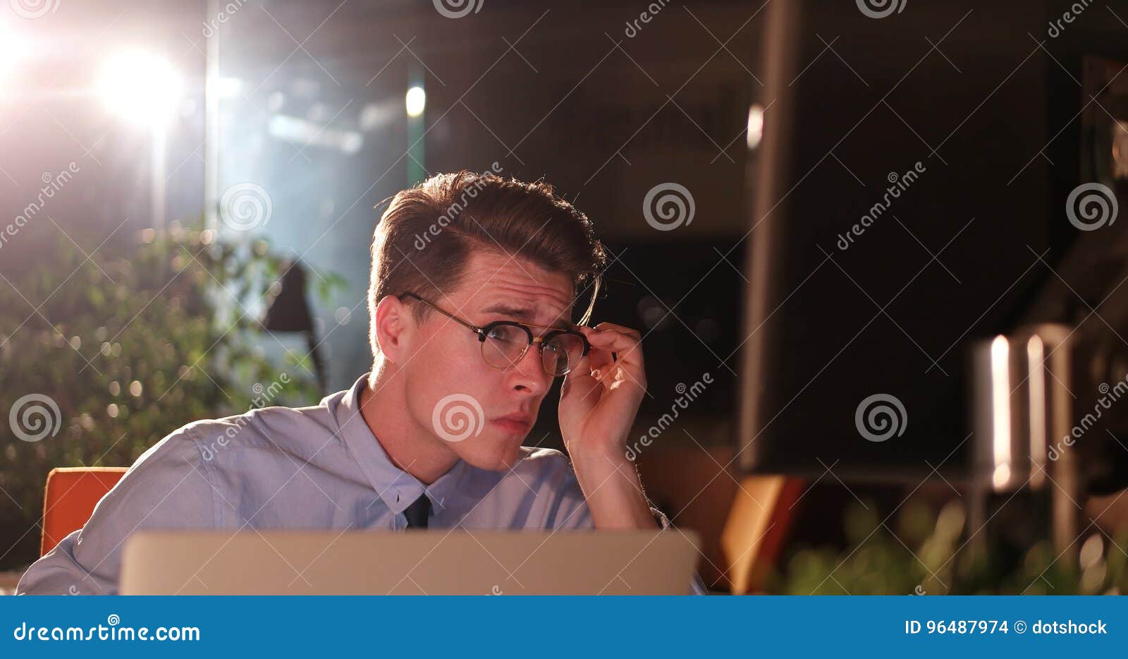 Man Working on Computer in Dark Office Stock Photo - Image of business ...