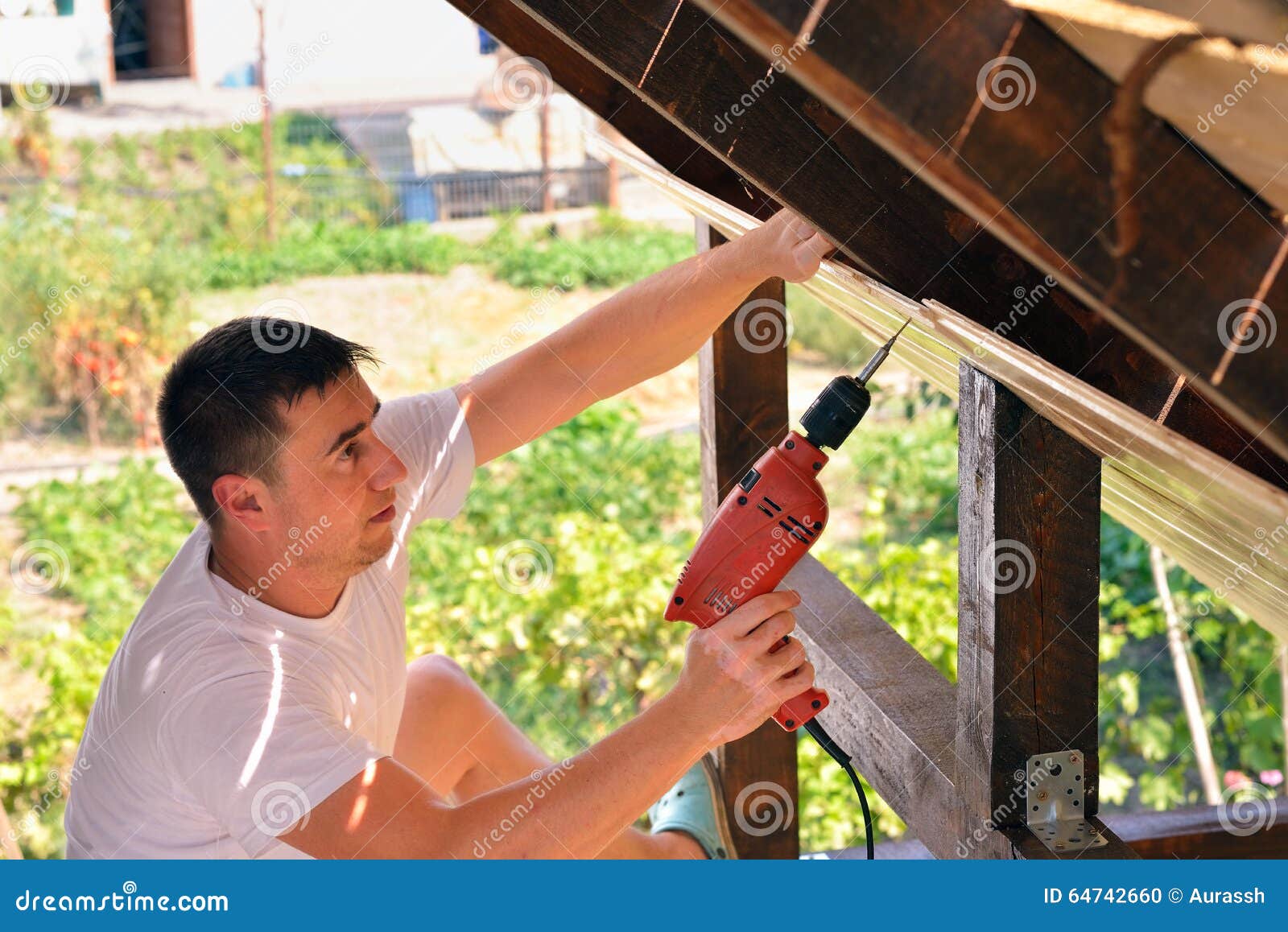 Young Man Working with Drill Stock Photo - Image of drill, holding ...